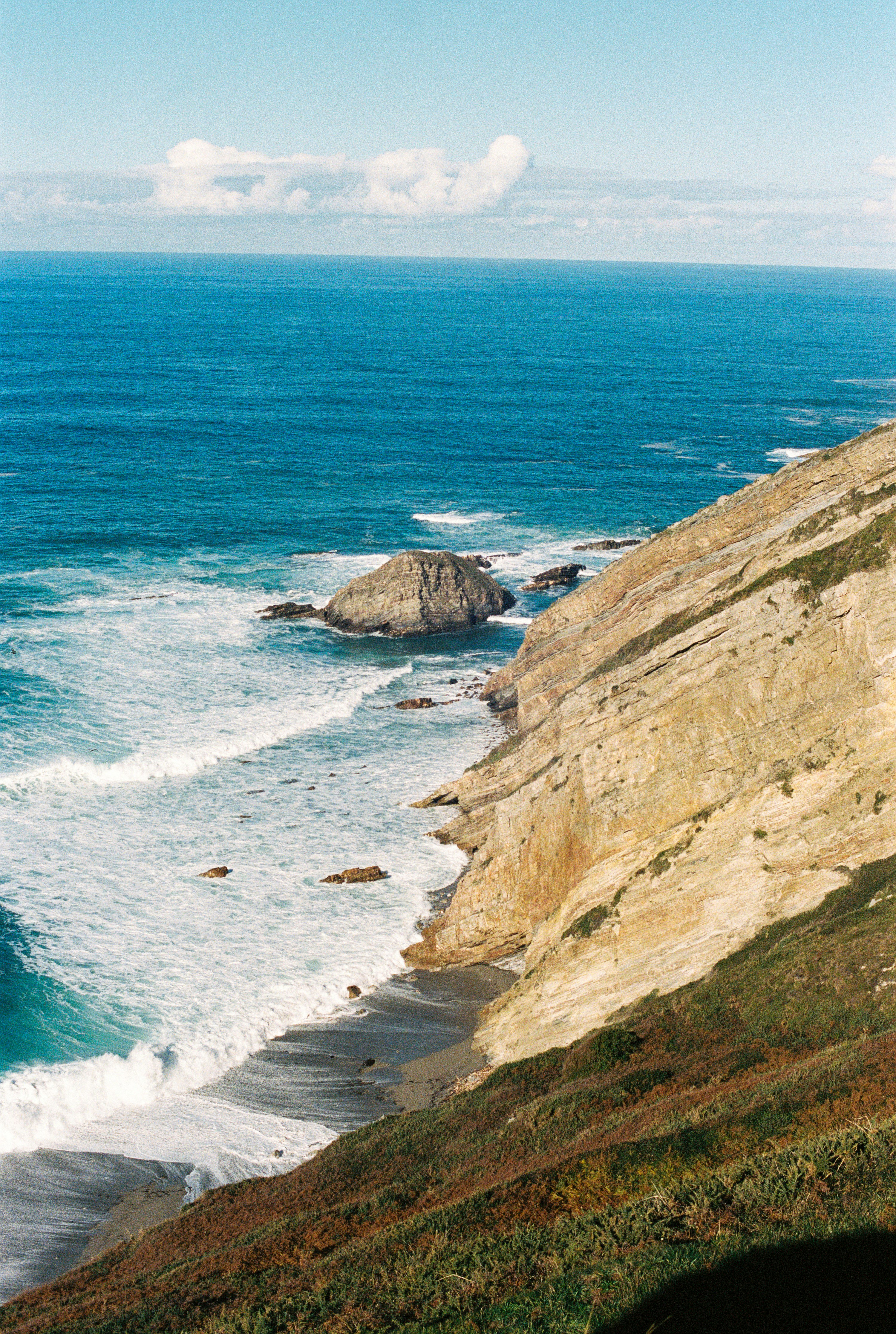 Cabo Vidio | Rocky coastline with waves crashing on the shore