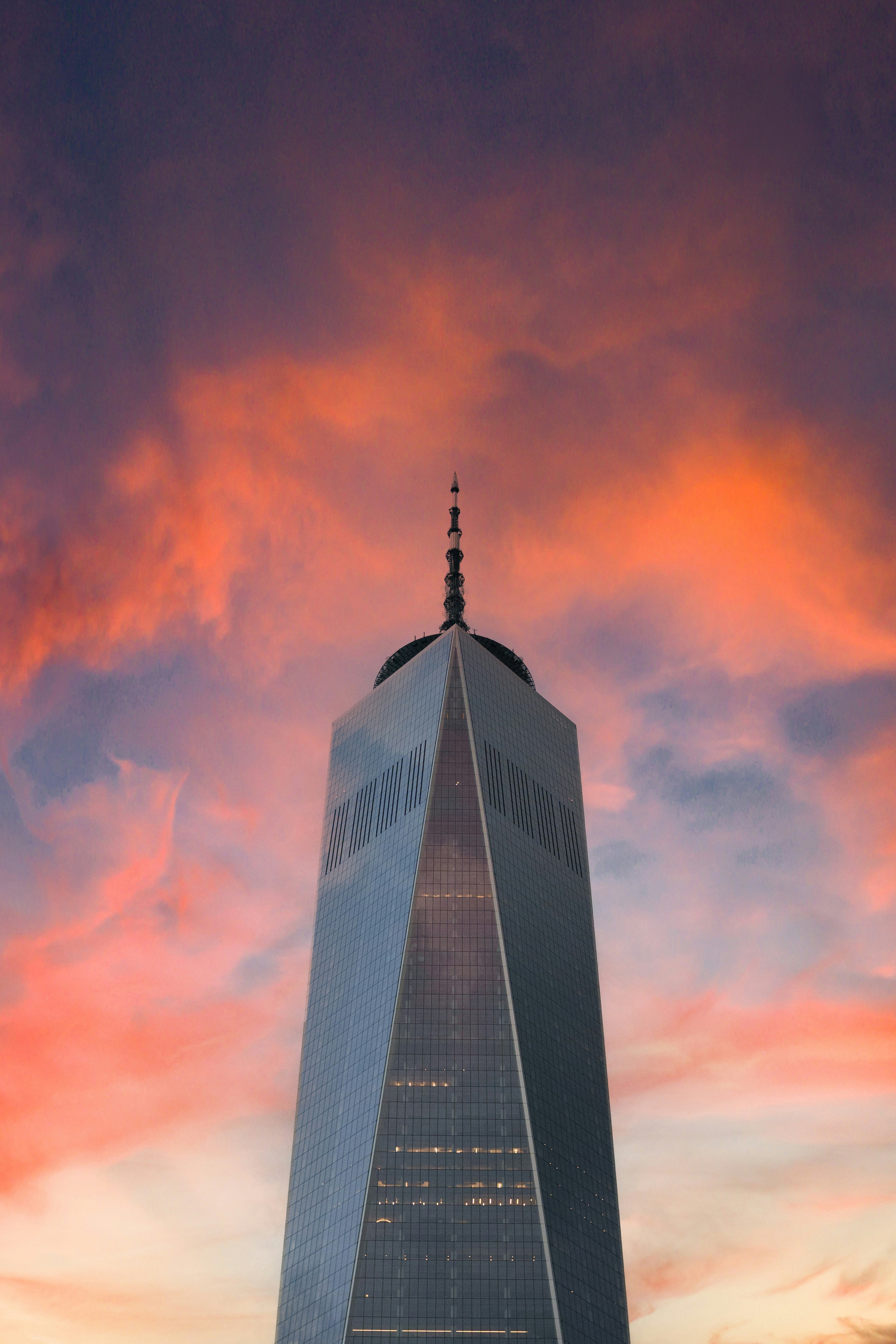 One world trade center against a dramatic sunset sky