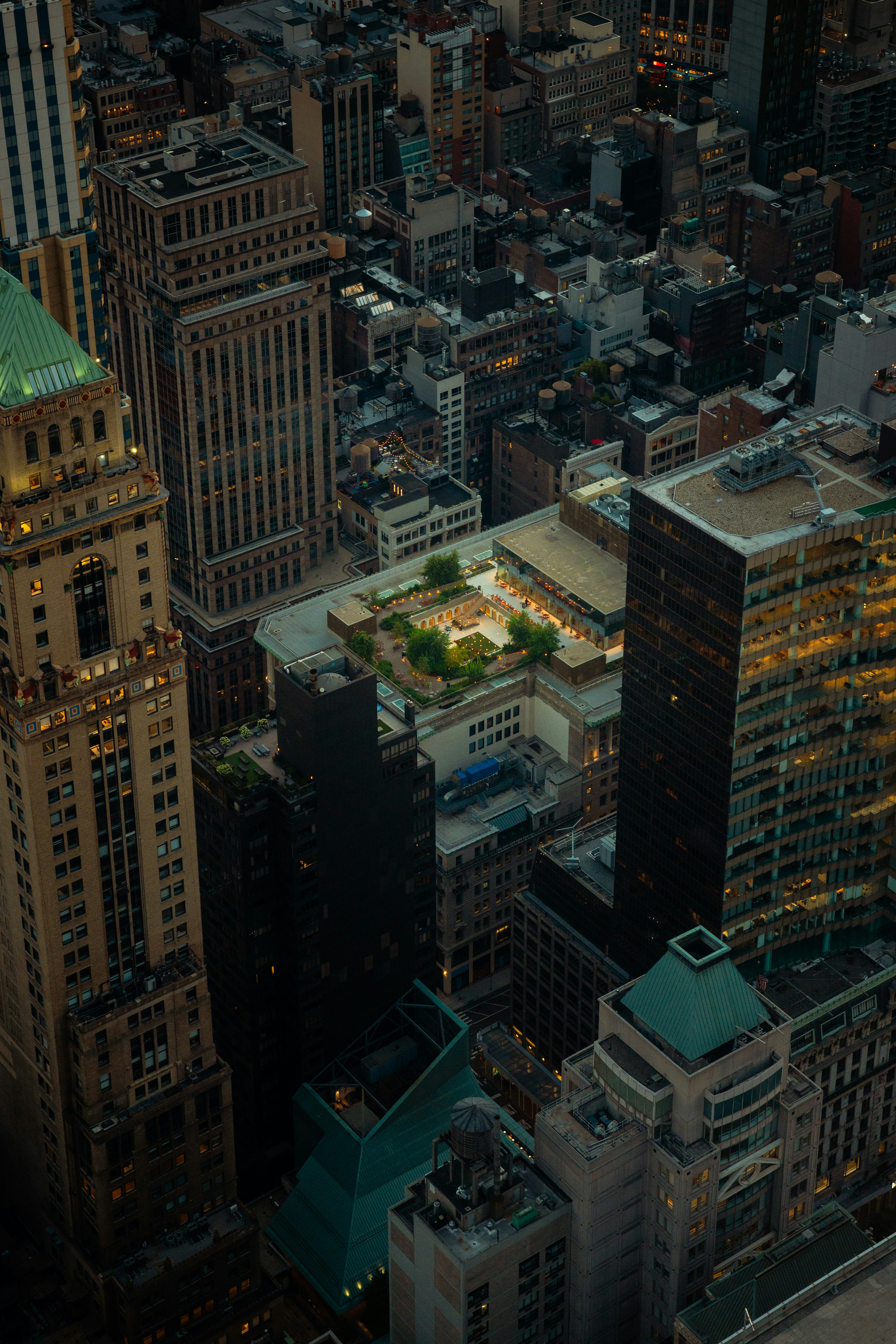 Rooftop Oasis Above the City Grid at Dusk