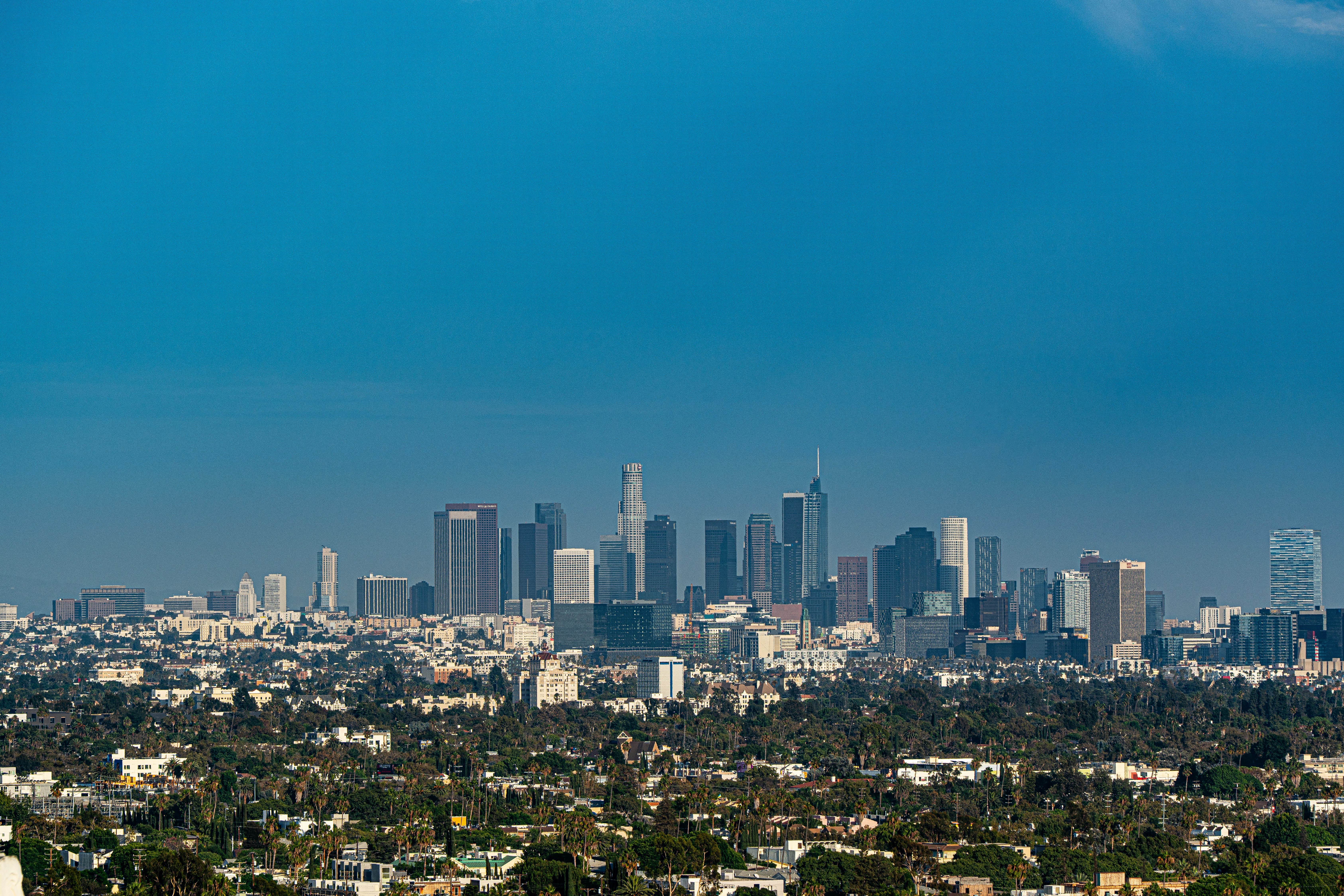 Downtown los angeles skyline under a clear blue sky