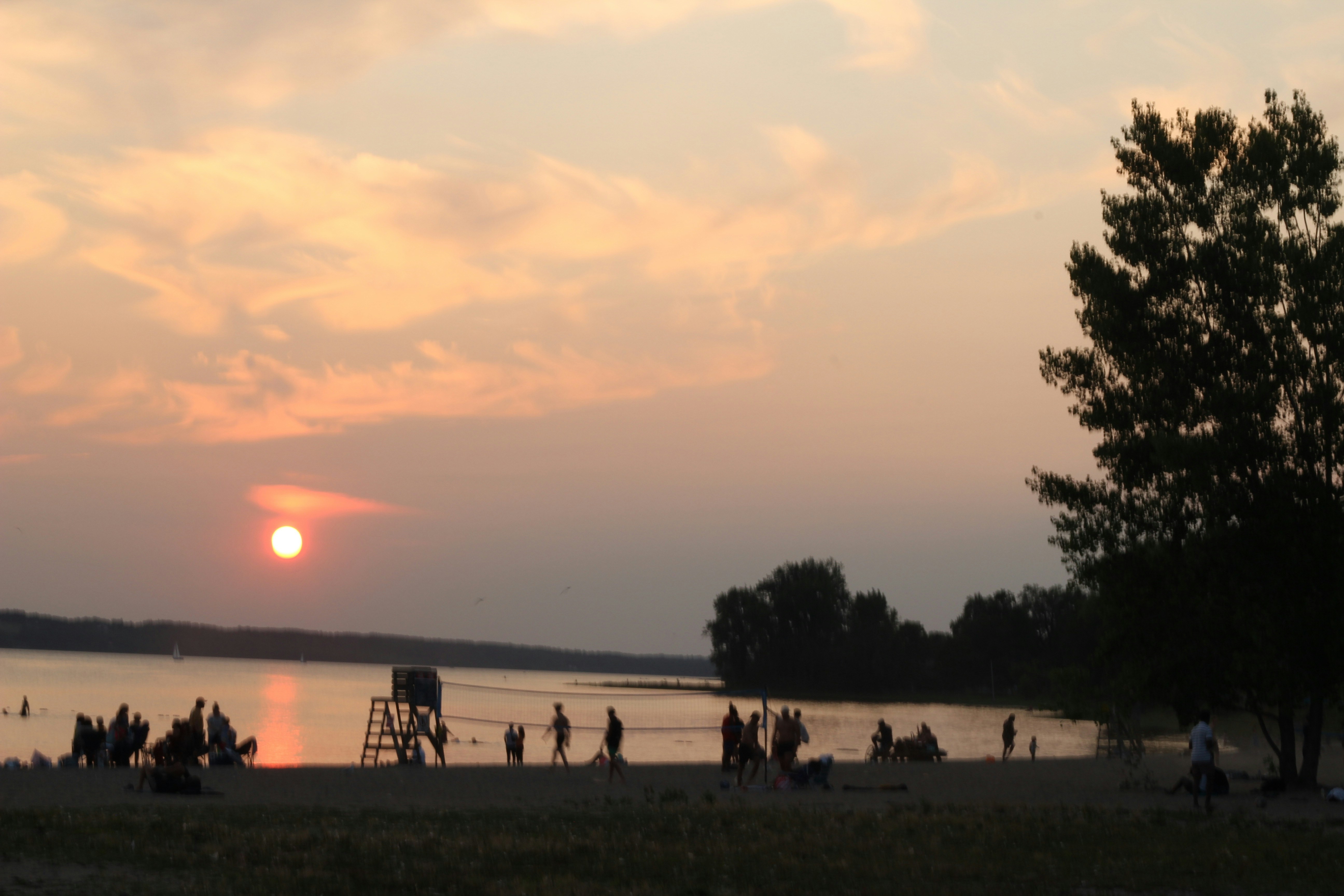 Twilight Reflections: A Gathering by the Water