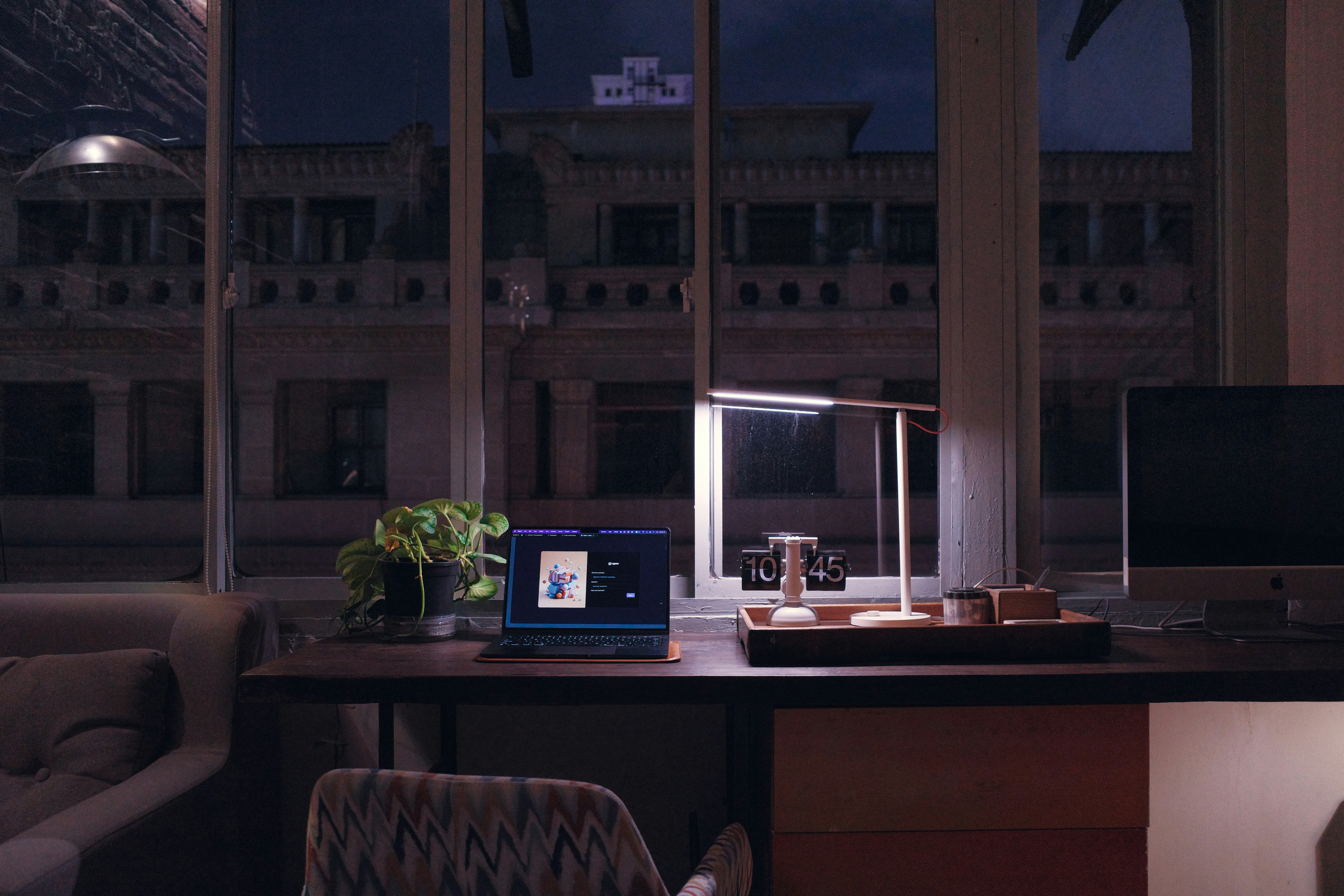 A Serene Workspace Amidst Urban Nightfall