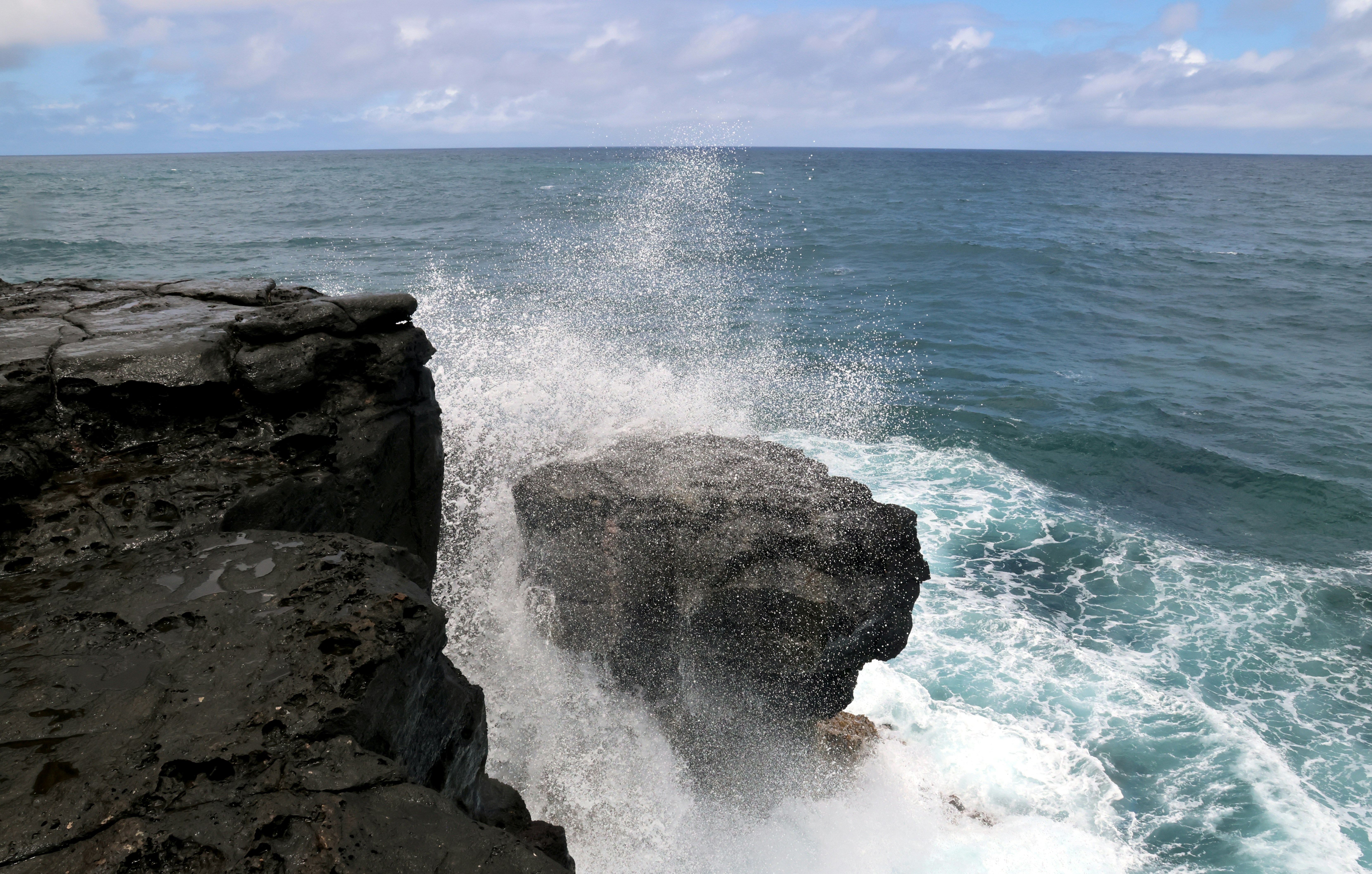 Ocean's Embrace: The Dance of Water and Rock