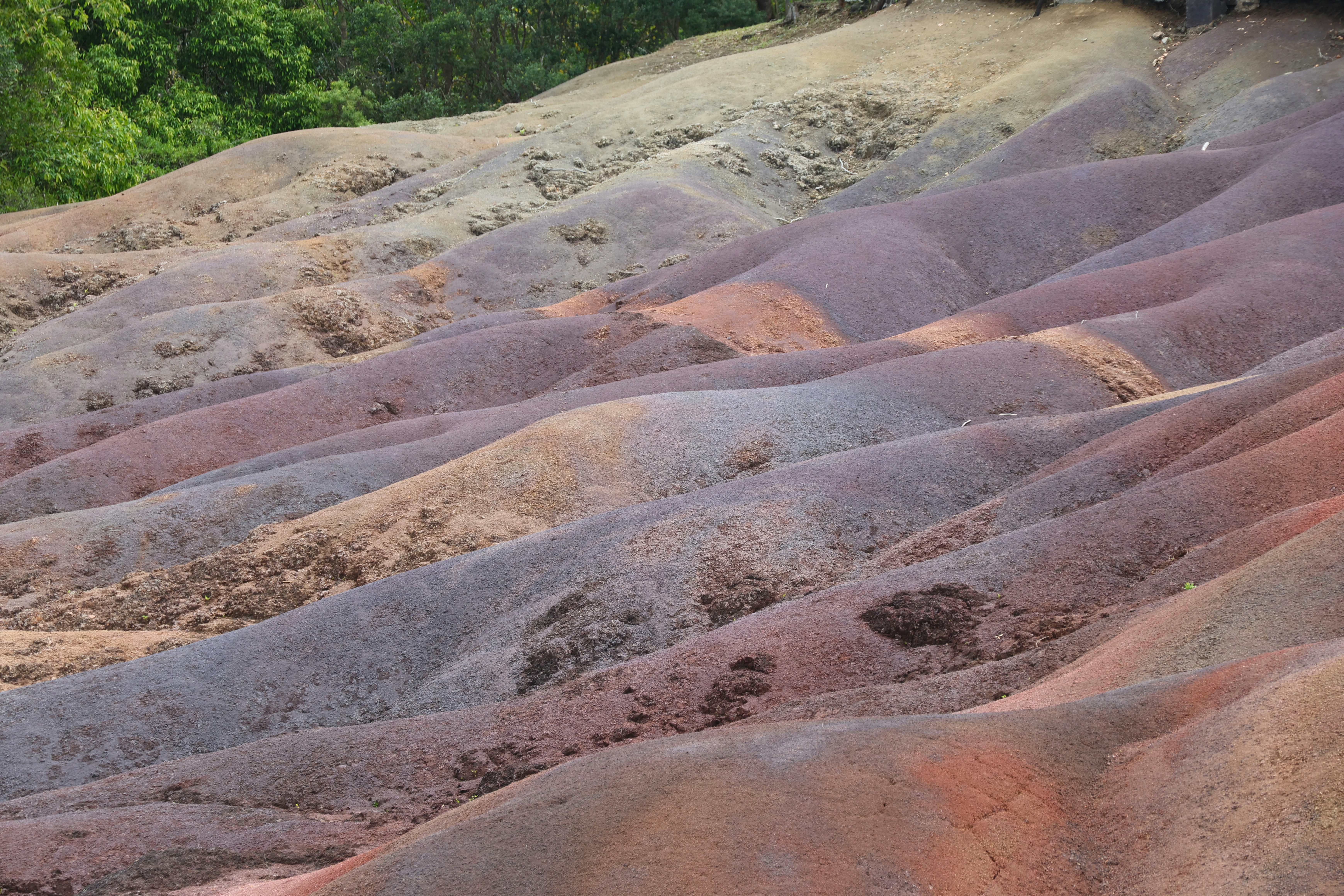 Pastel Ridge: Eroded Hills in a Rainbow Landscape