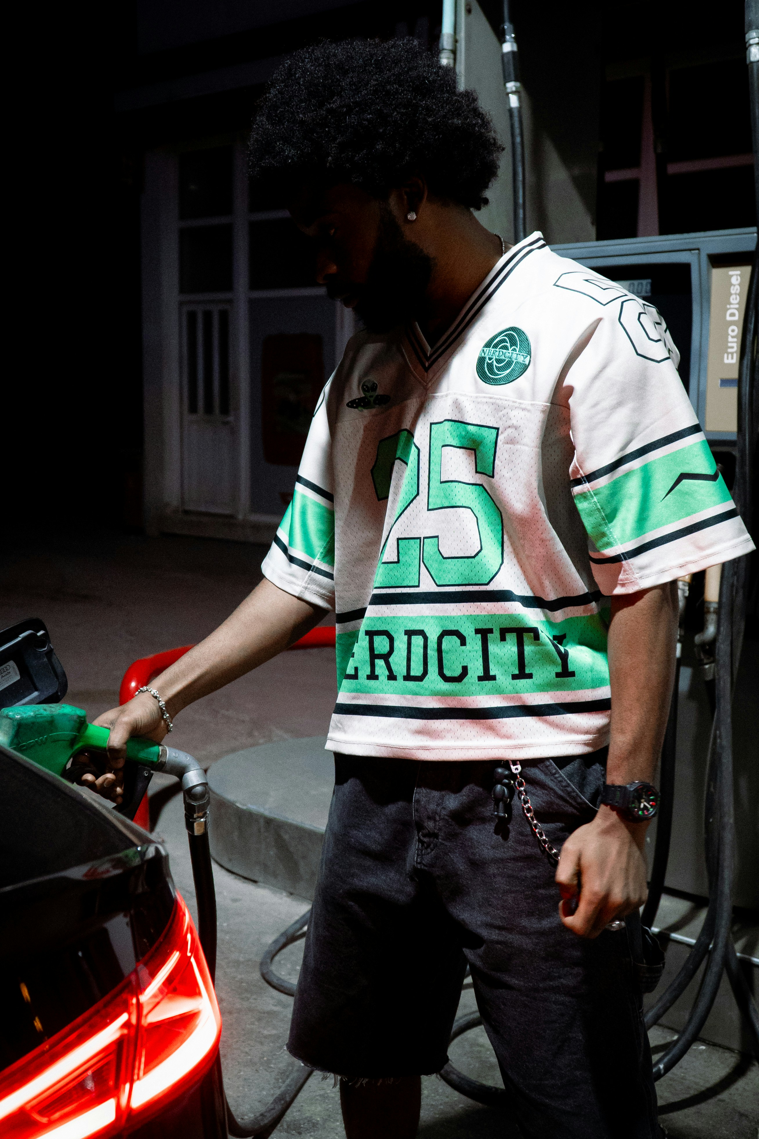 Midnight Shift at the Pump: Jersey 25 Under Neon