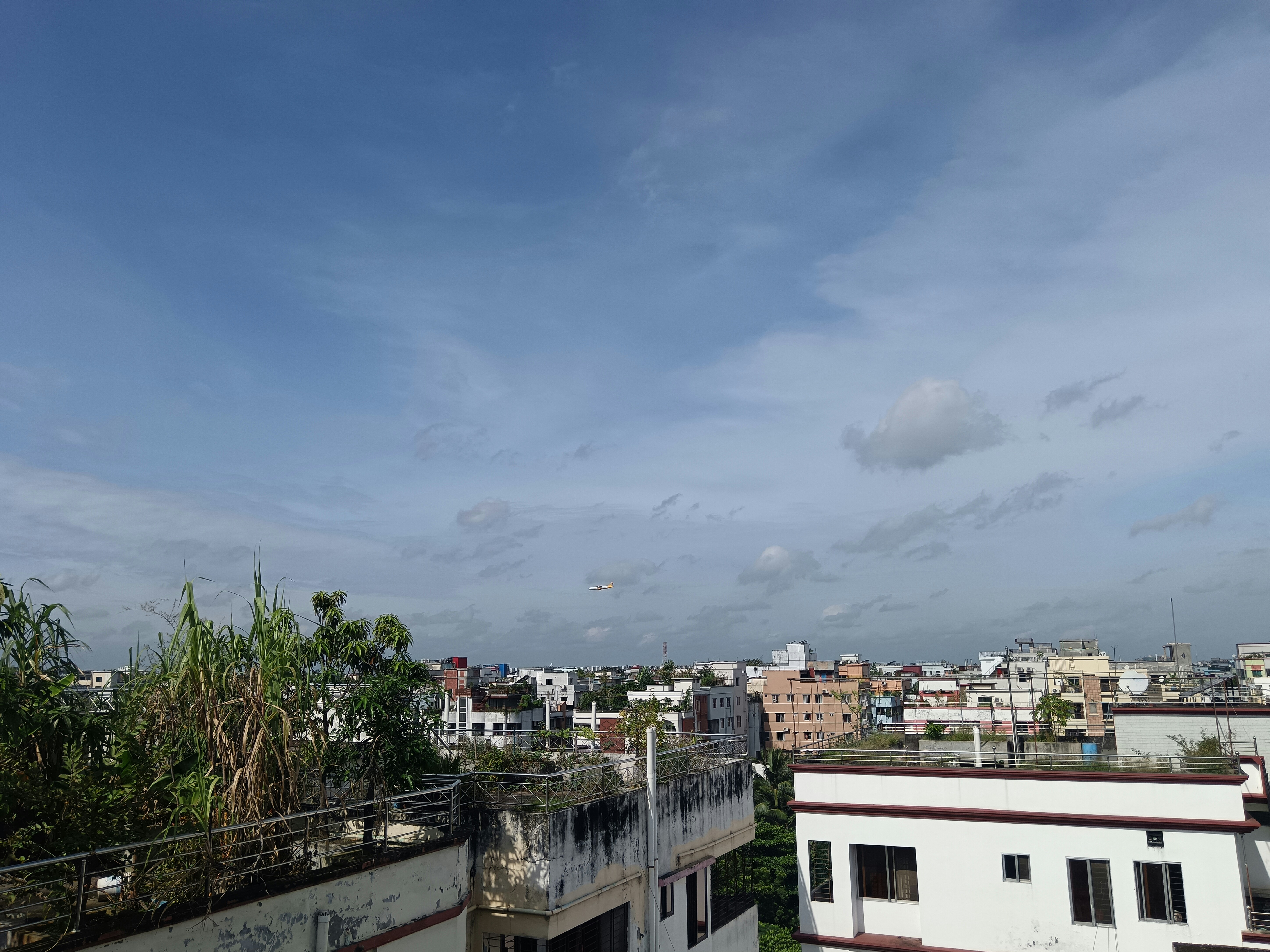 City skyline under a cloudy blue sky