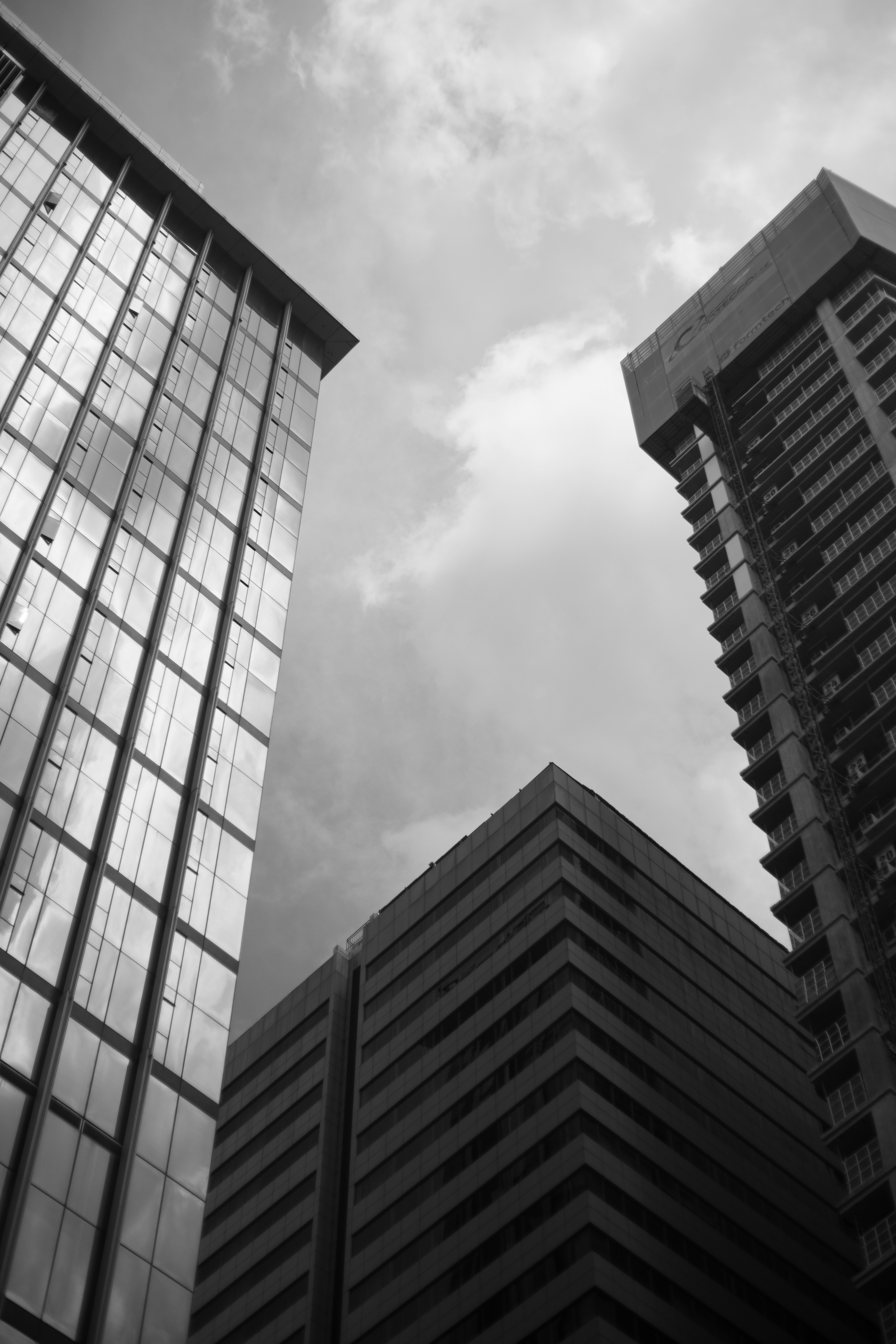 Modern skyscrapers against a cloudy sky
