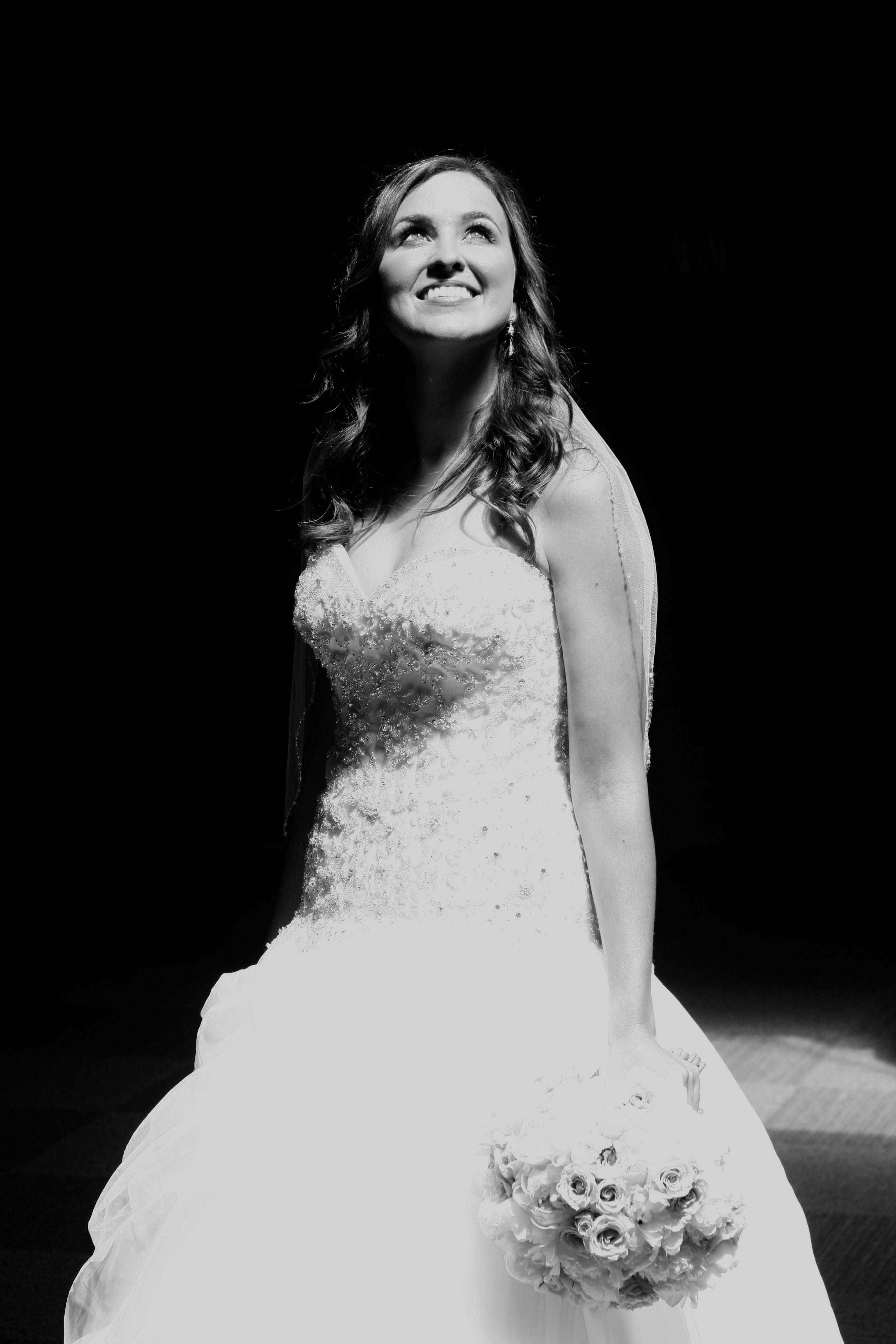 Illuminated Grace: A Bride's Moment of Reflection