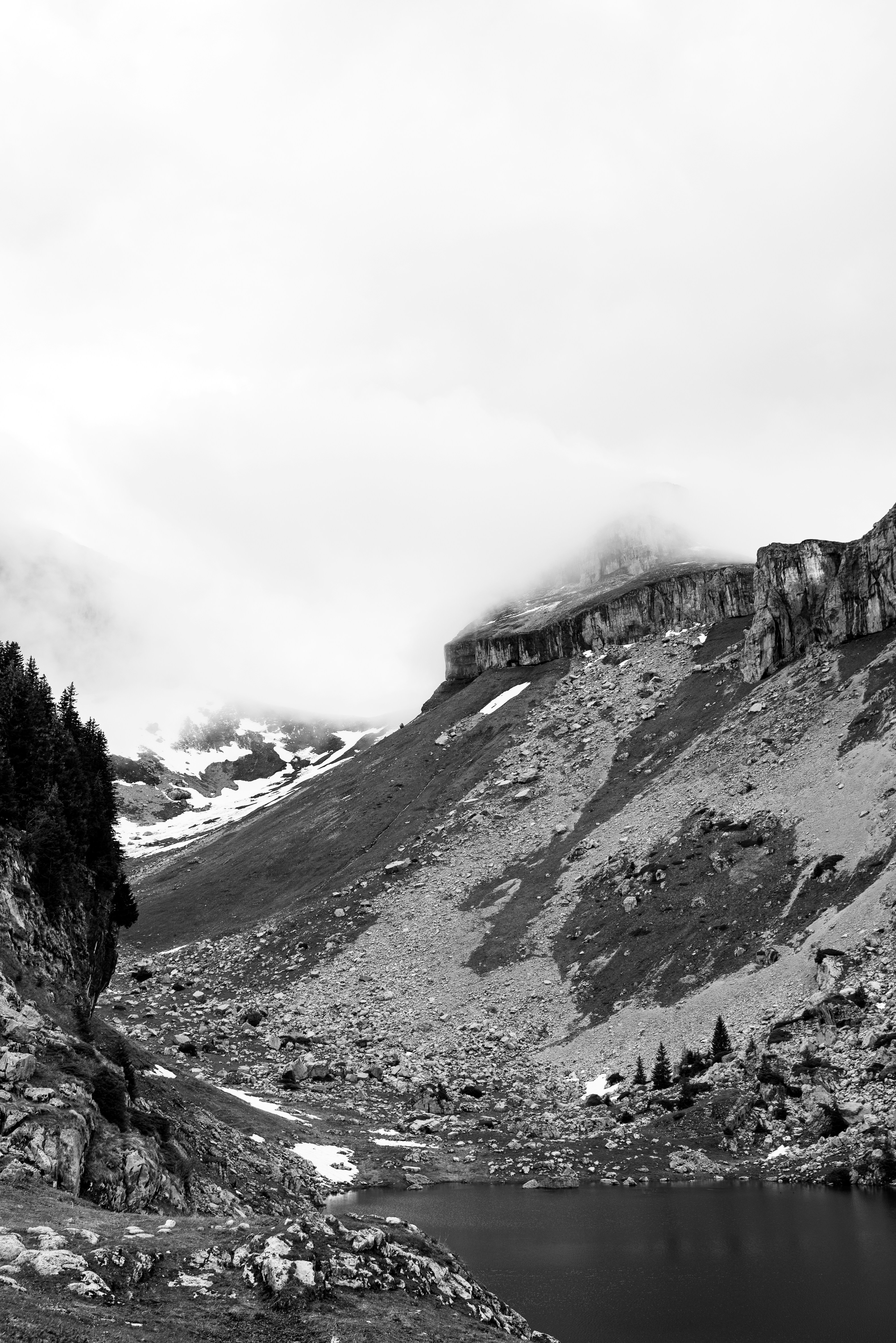 Black and white mountain landscape with lake