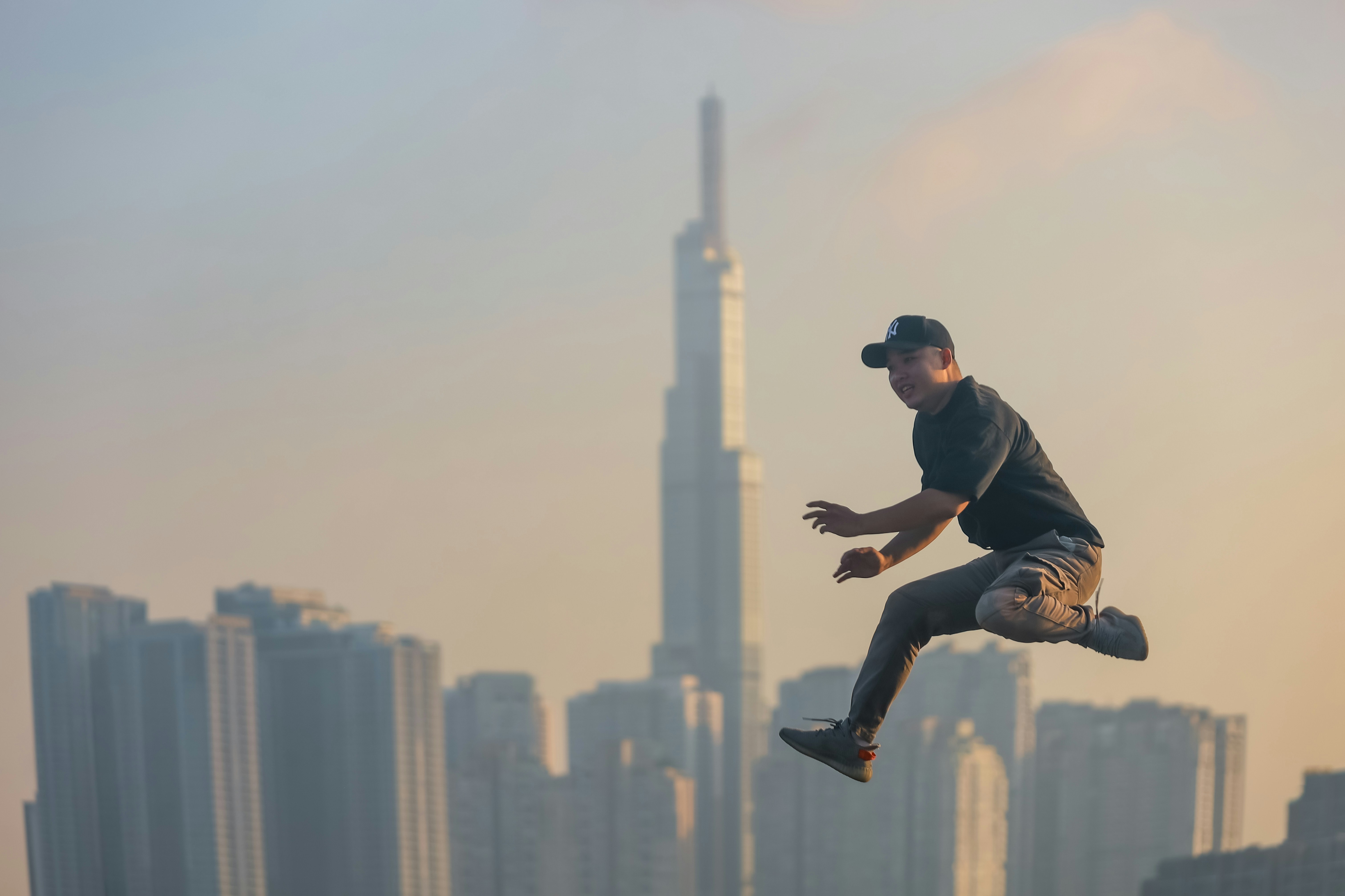 Urban Acrobatics Against a Skyline Backdrop
