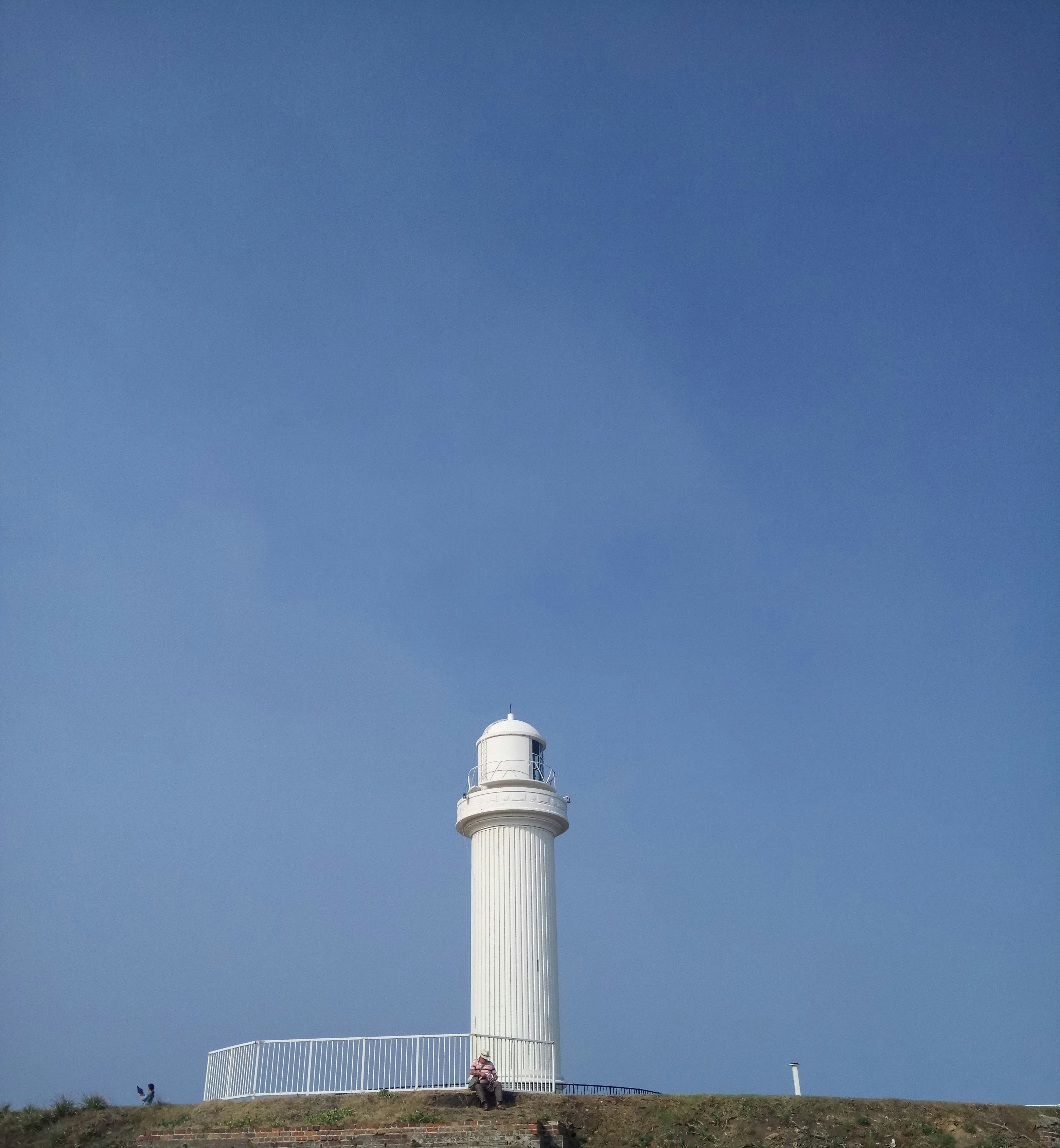 Solitary Beacon Against the Azure Sky