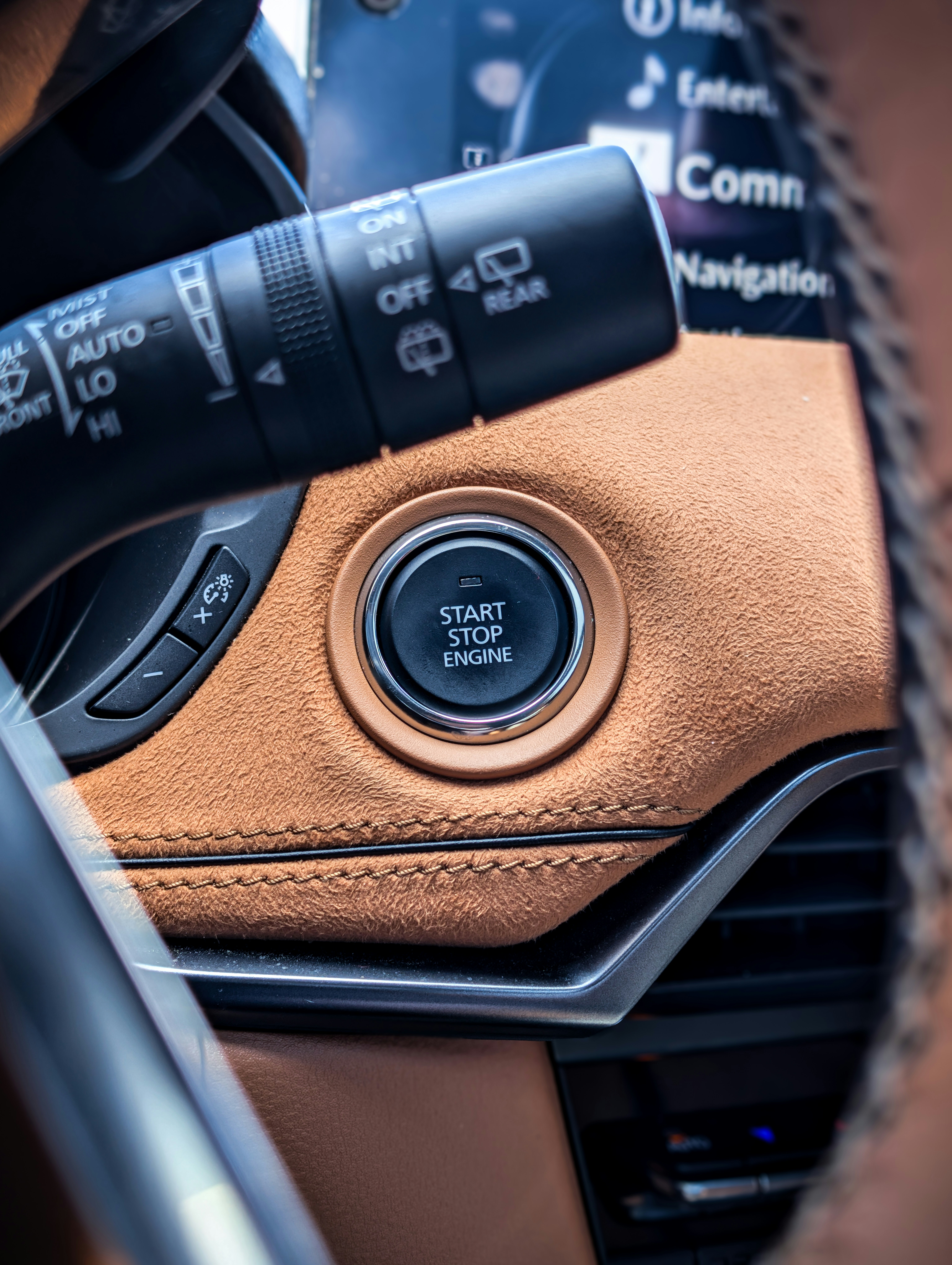 Close-up of a car's start-stop engine button