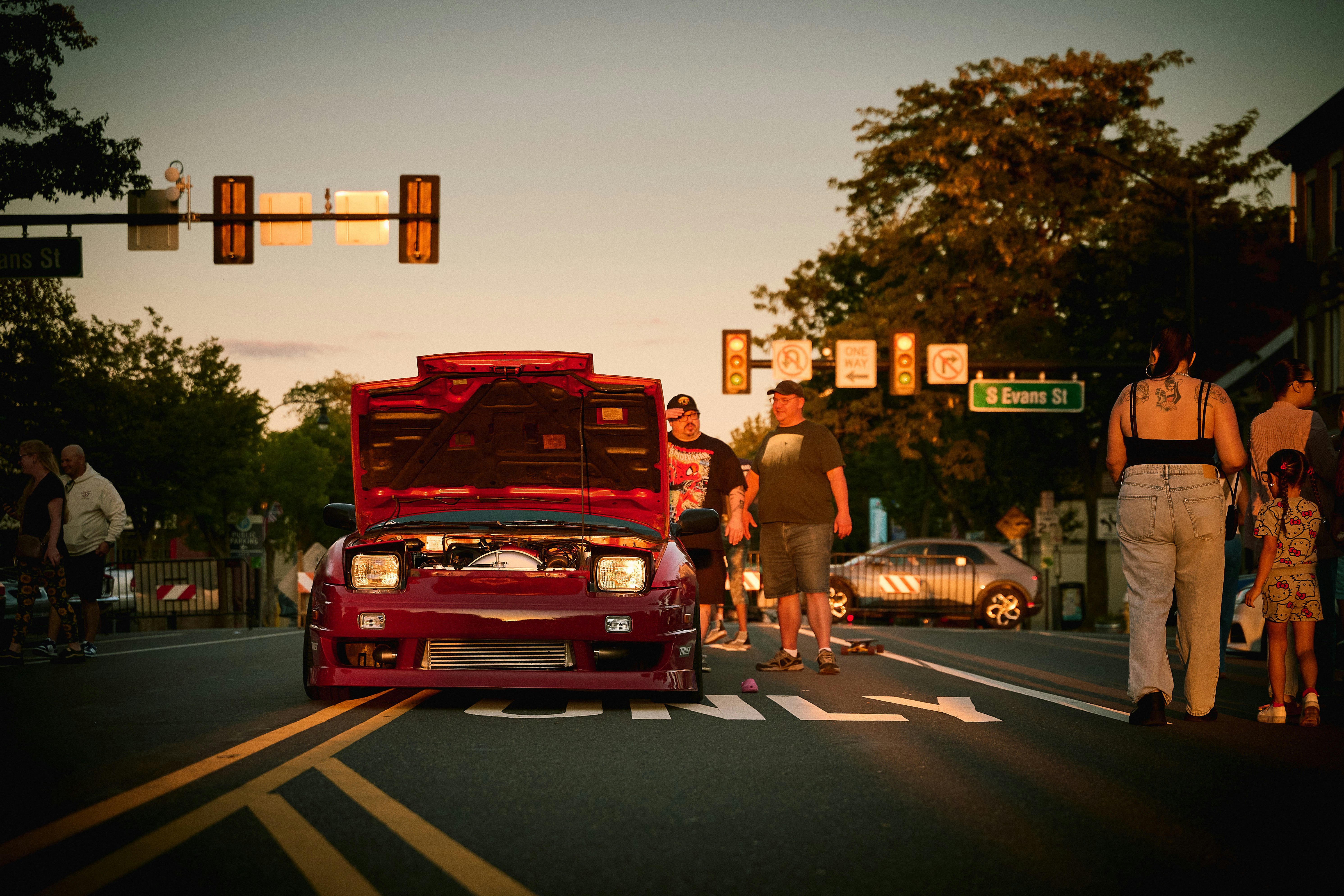 Cruising into the Sunset: A Night of Automotive Passion