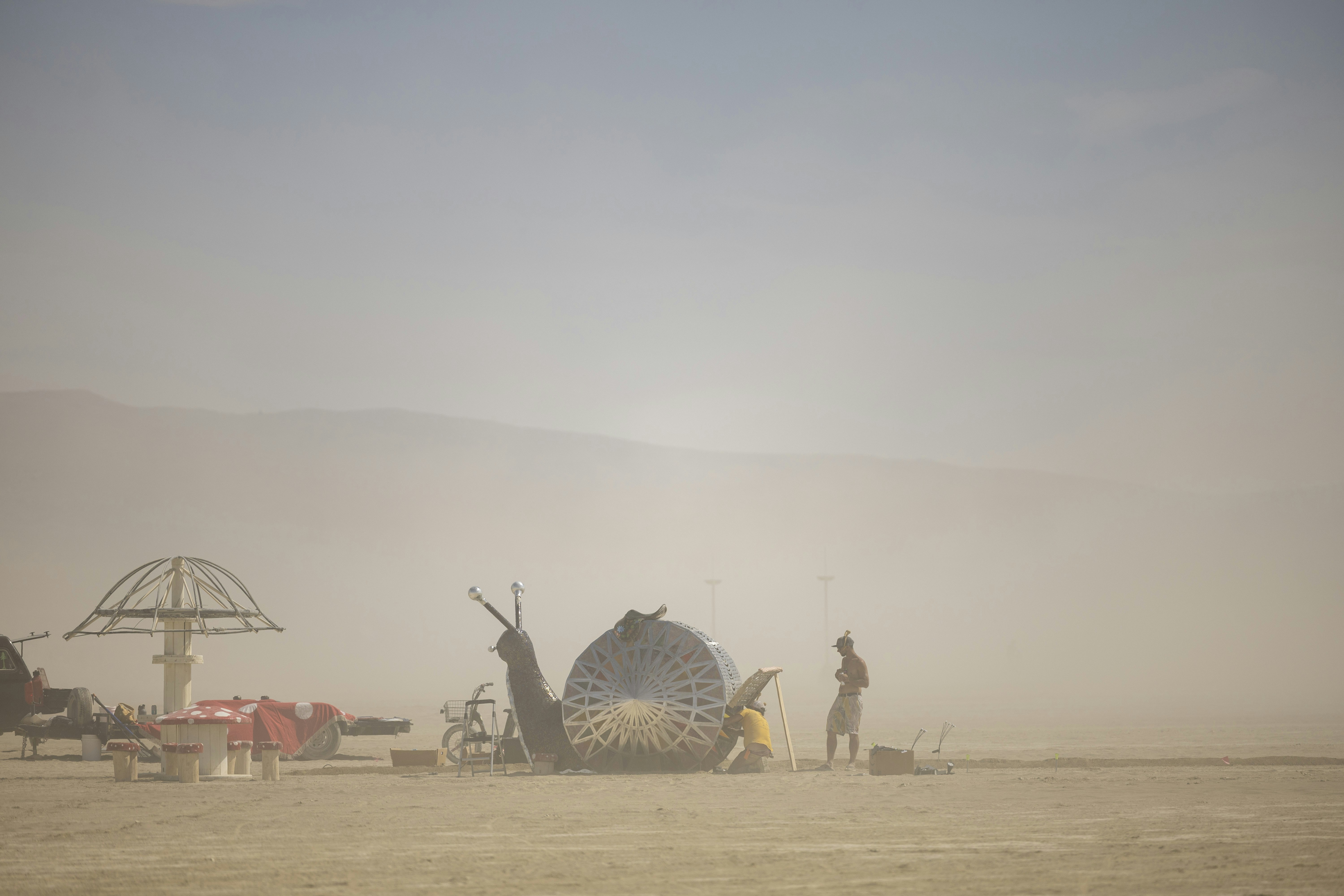 Dust and Drones: A Humble Camp in a Parched Horizon