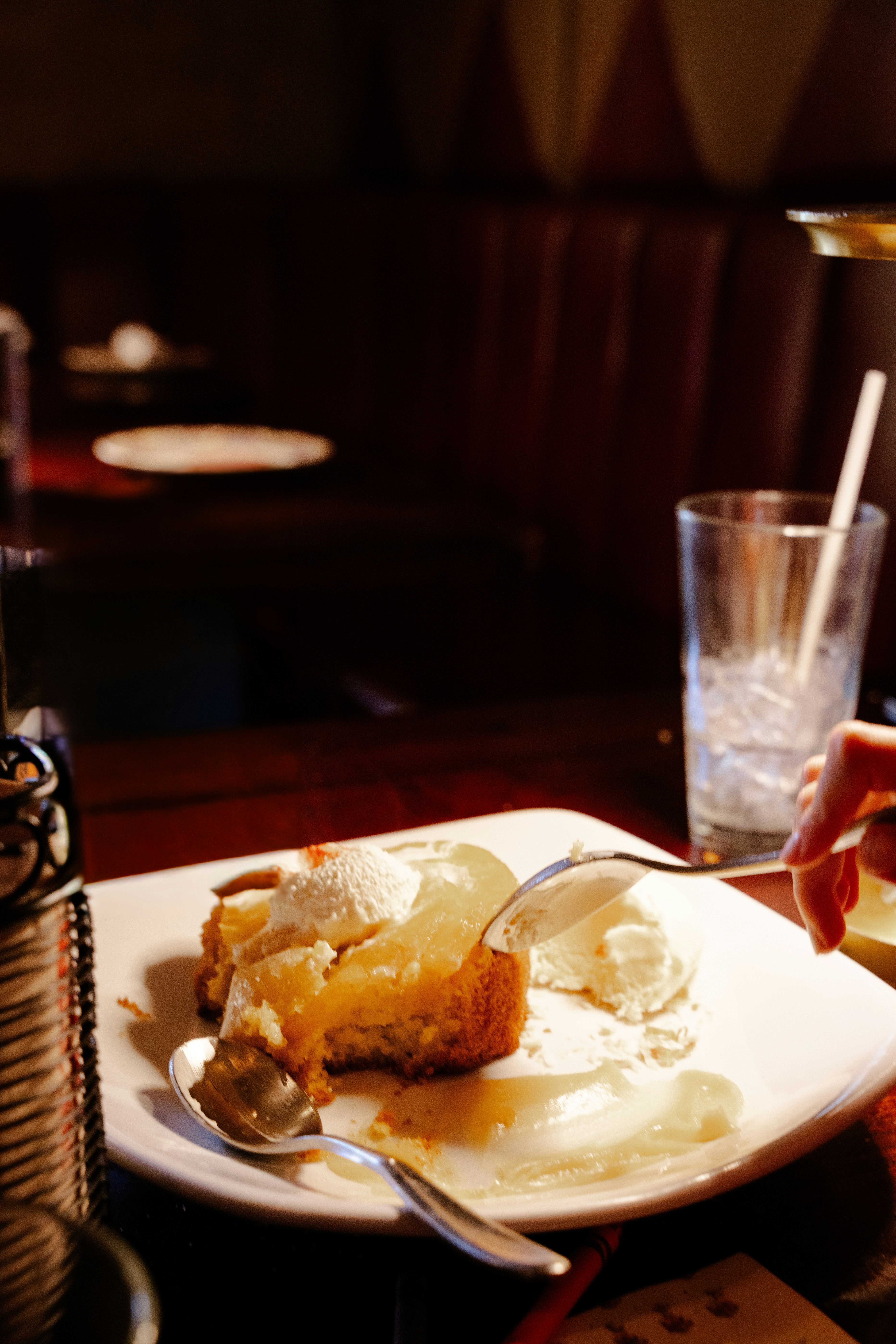 Sweet Slice on a Dimly Lit Table