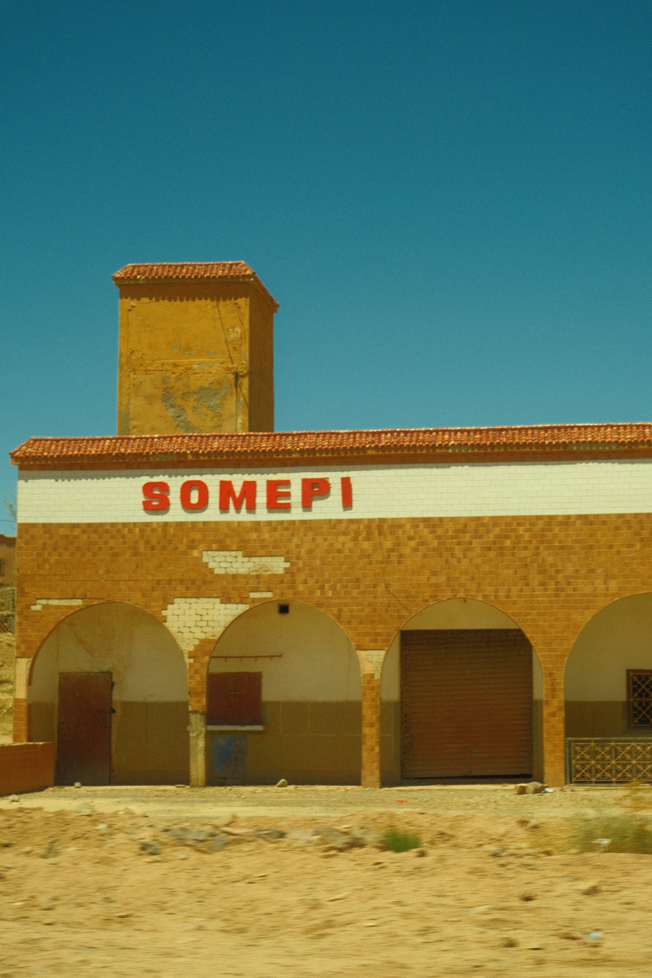 Echoes of Abandonment: The SOMEPI Facade