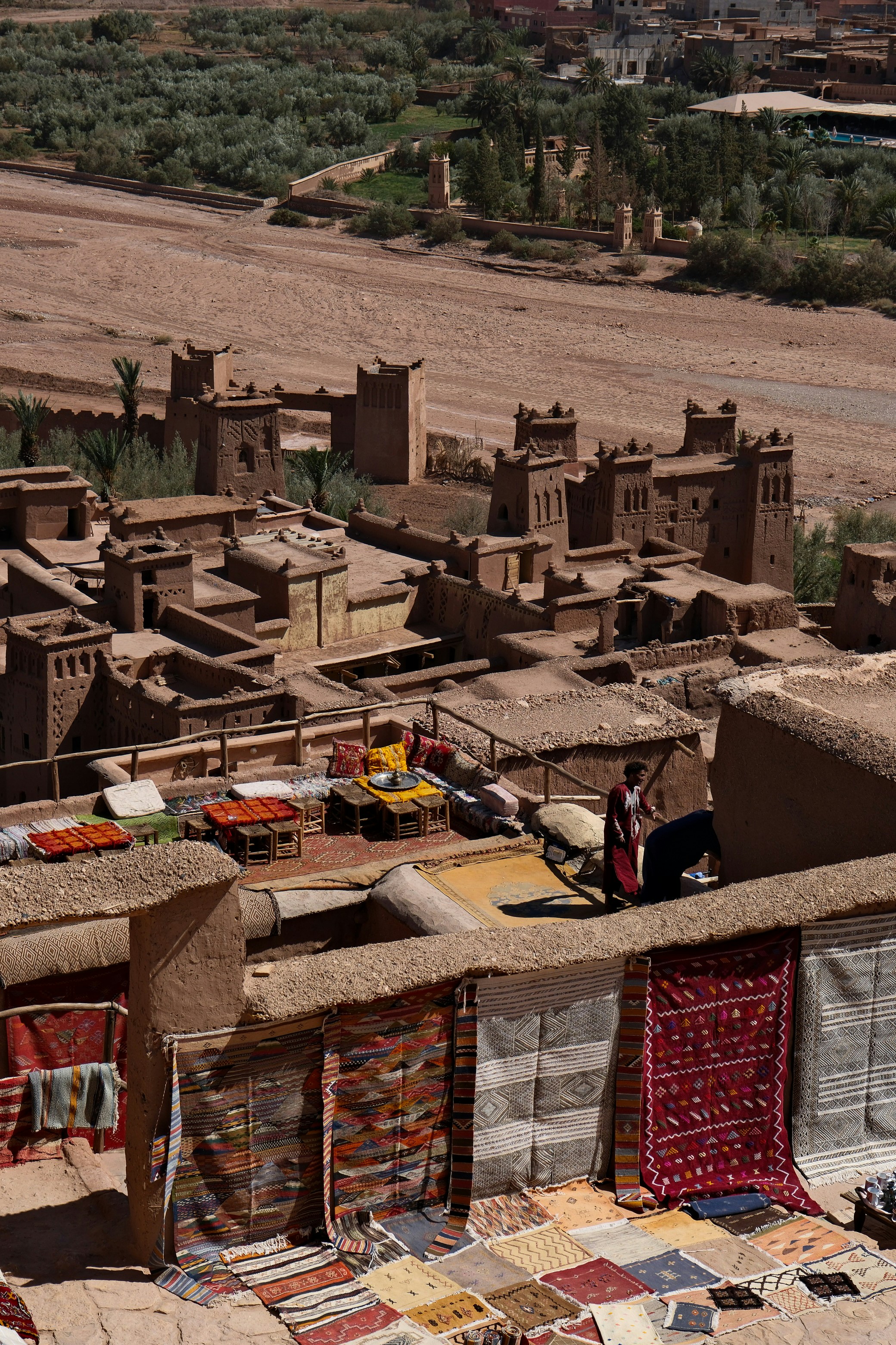 Market color and adobe rooftops in a sunlit desert fortress