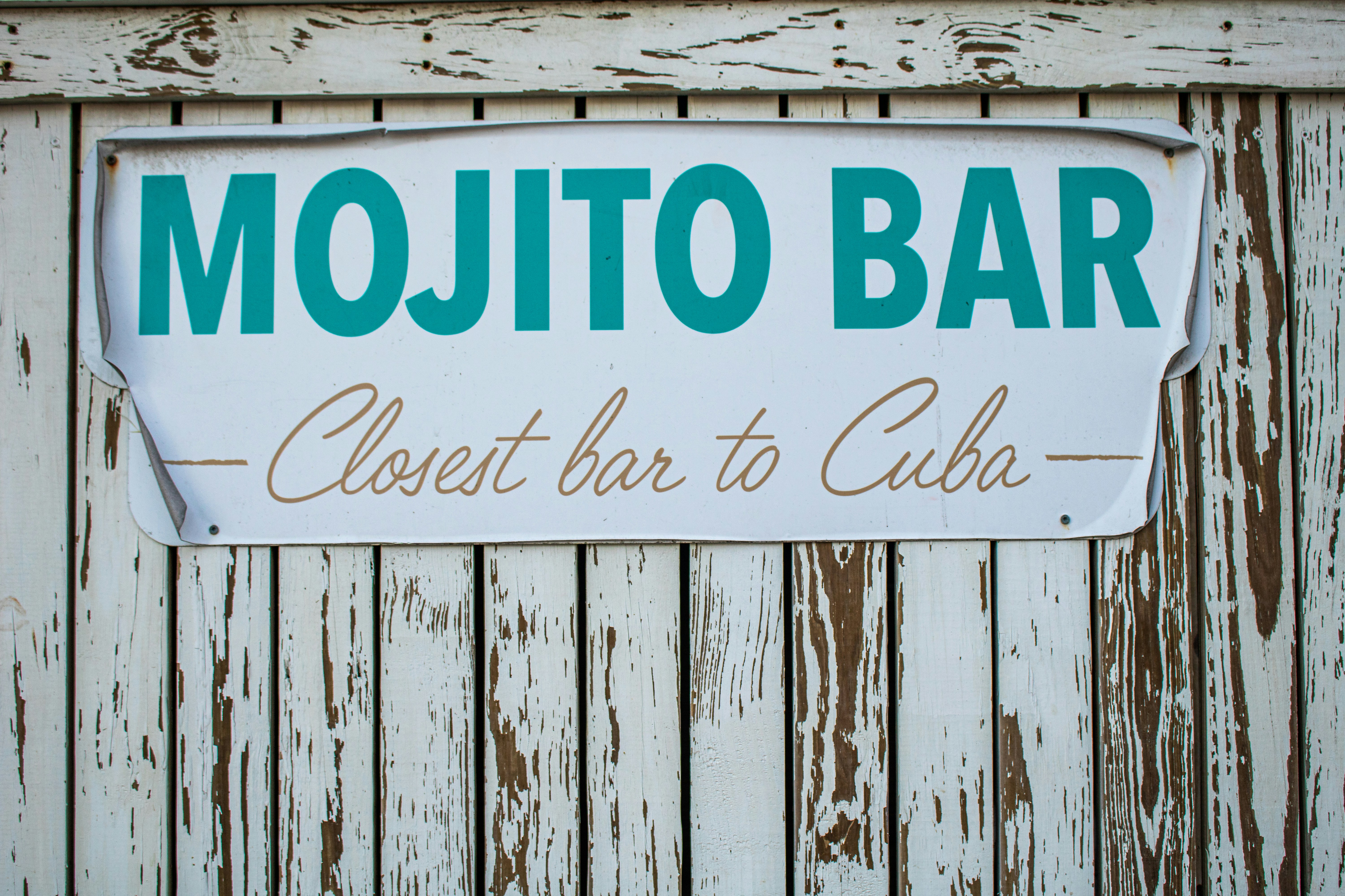 Mojito bar sign on weathered wooden wall photo – Free Bar Image on Unsplash