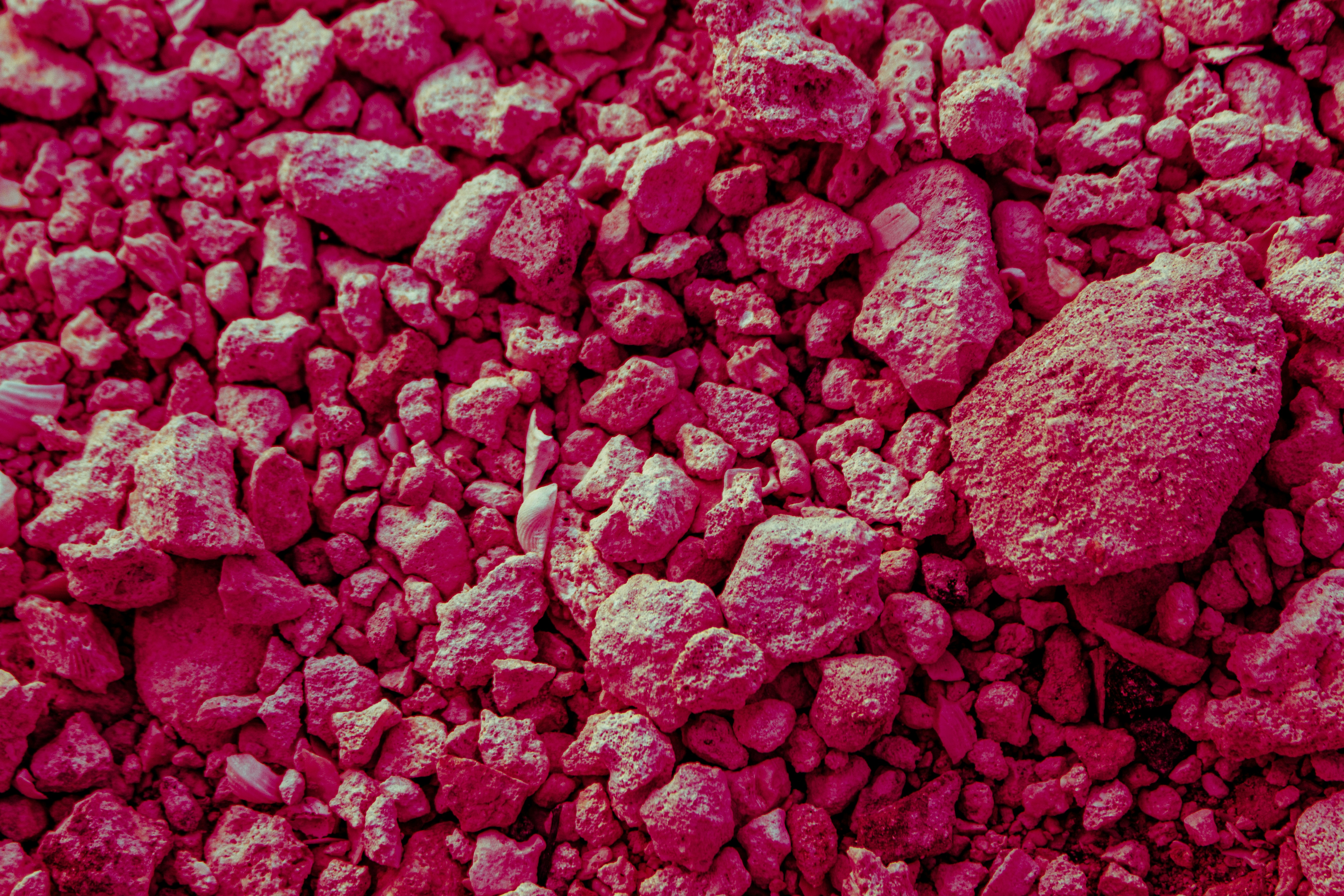 An experimental background photo made by me | Close-up of reddish-pink soil and rocks