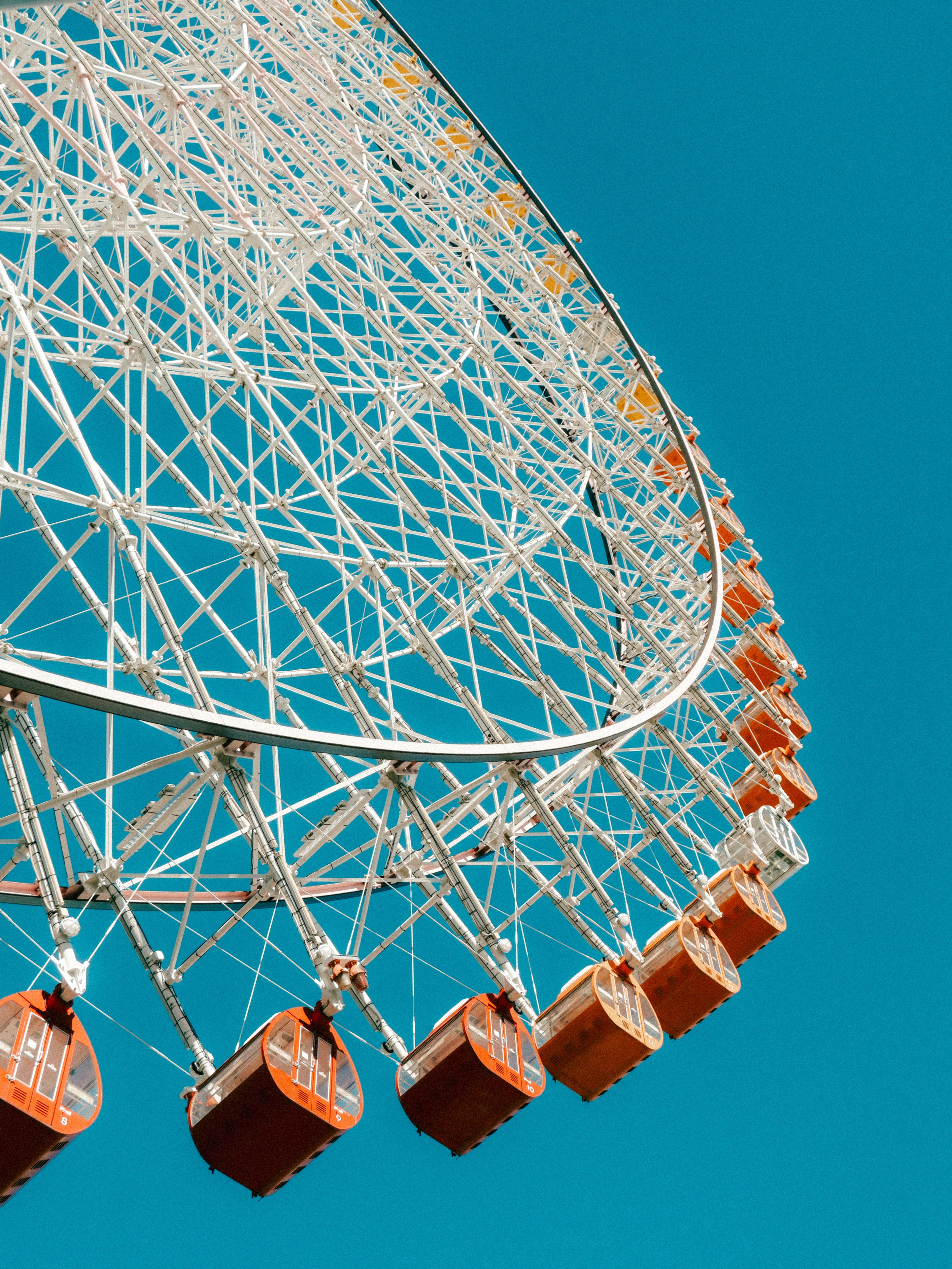 Whirling Joy: A Modern Ferris Wheel Against the Sky