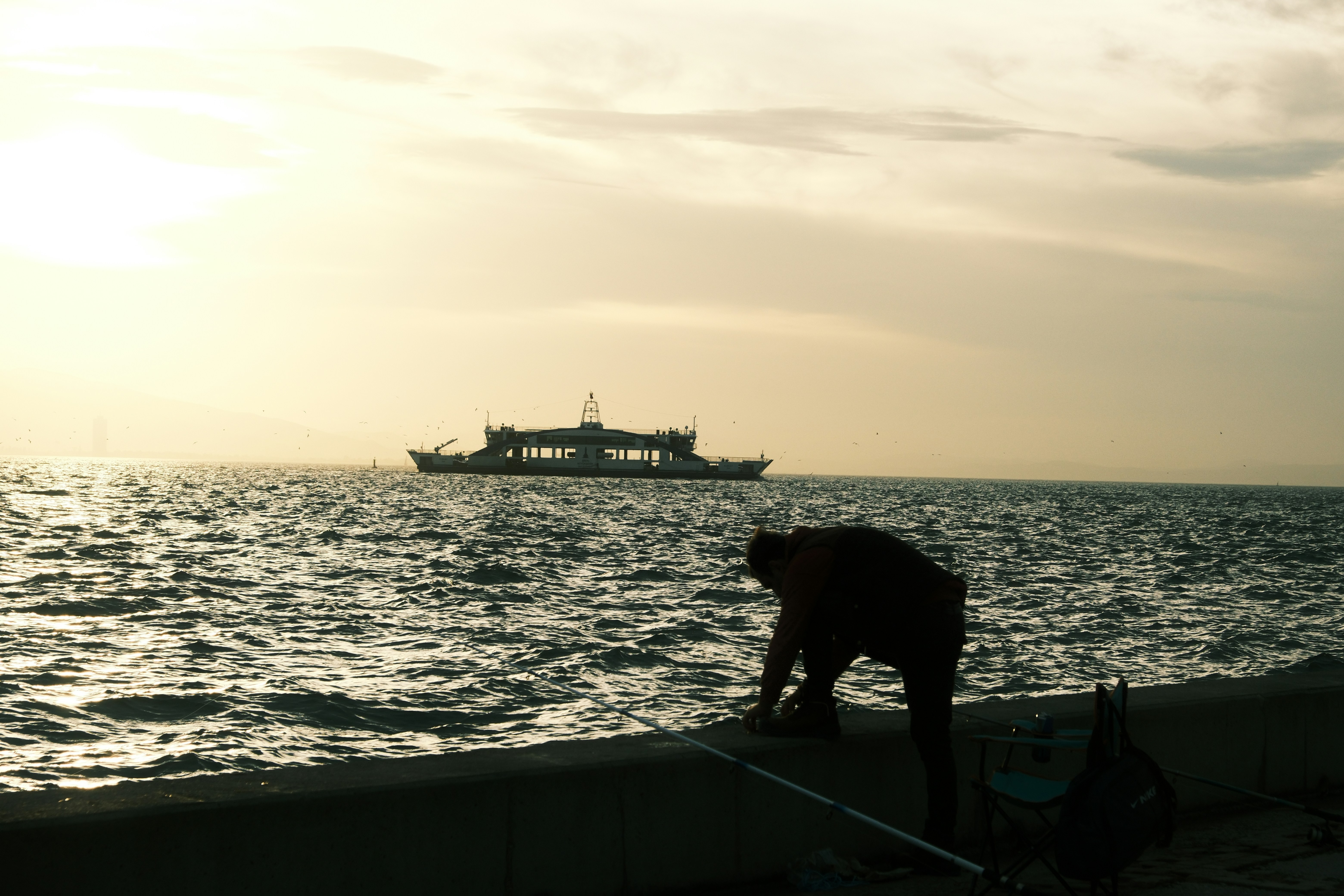 Serenity at Dusk: The Fisherman's Reflection