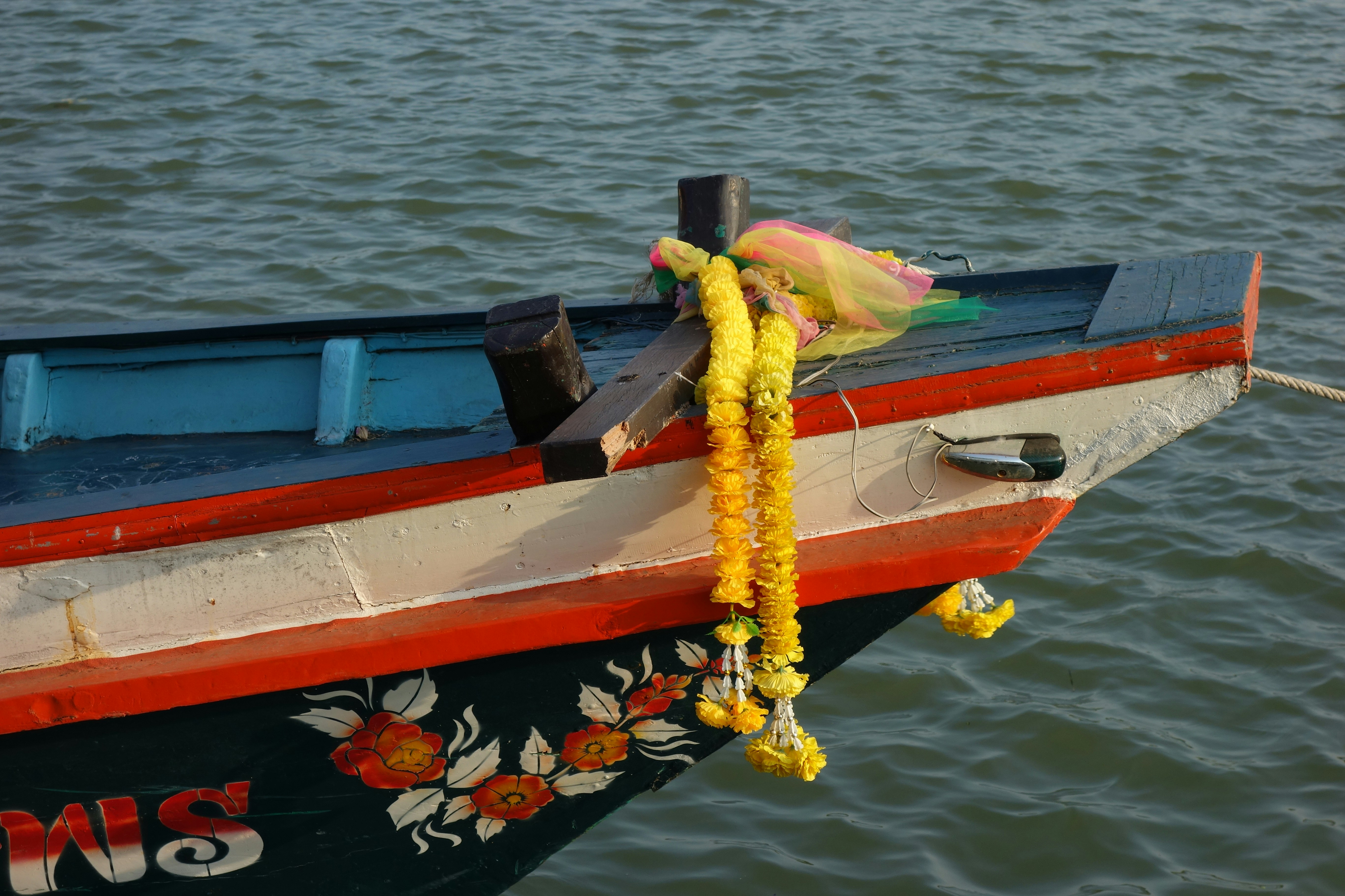 A decorated boat bow floats on the water photo – Free Image on Unsplash