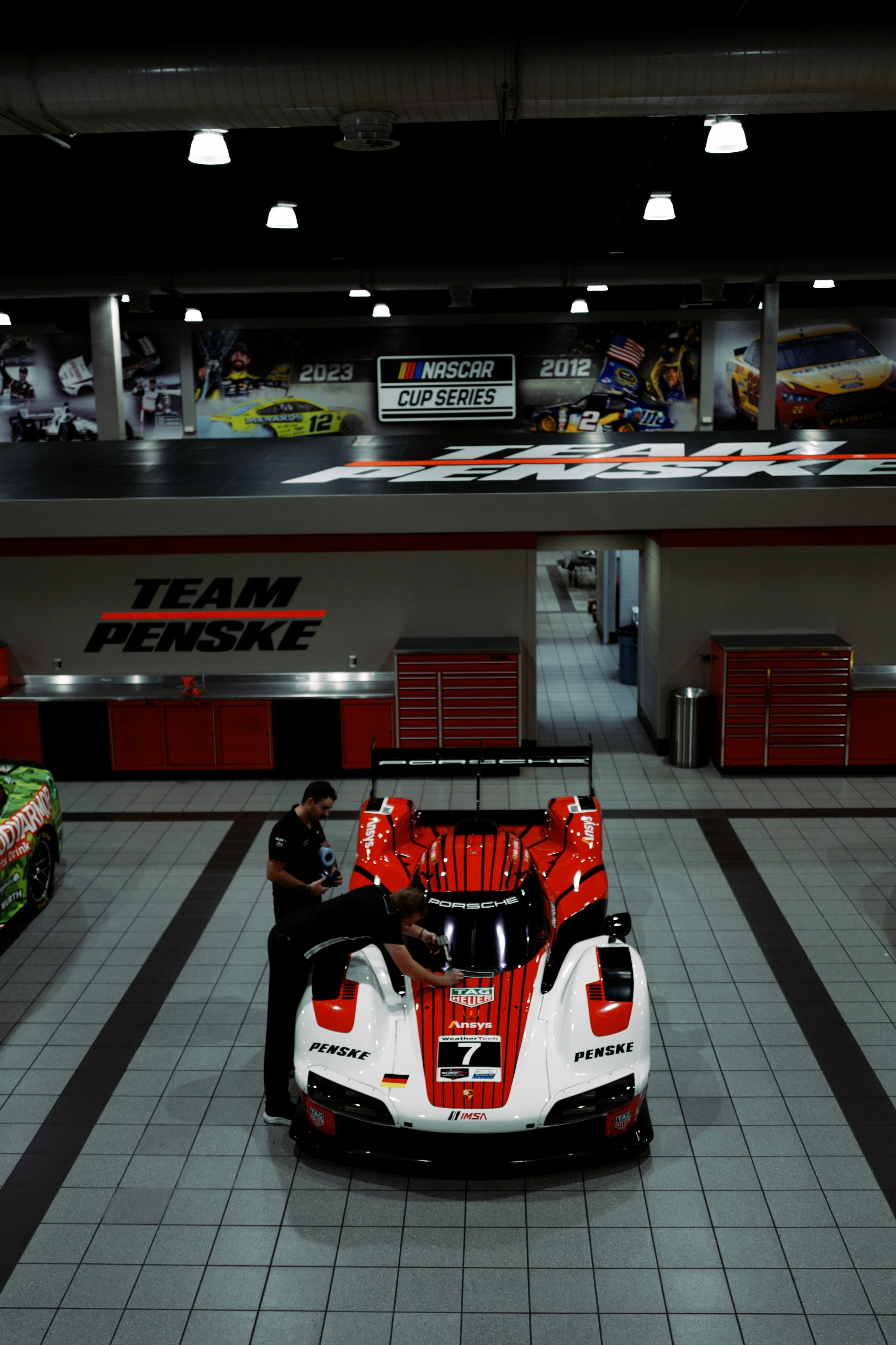 Penske Prototype Center Stage Under Fluorescent Garage Lights