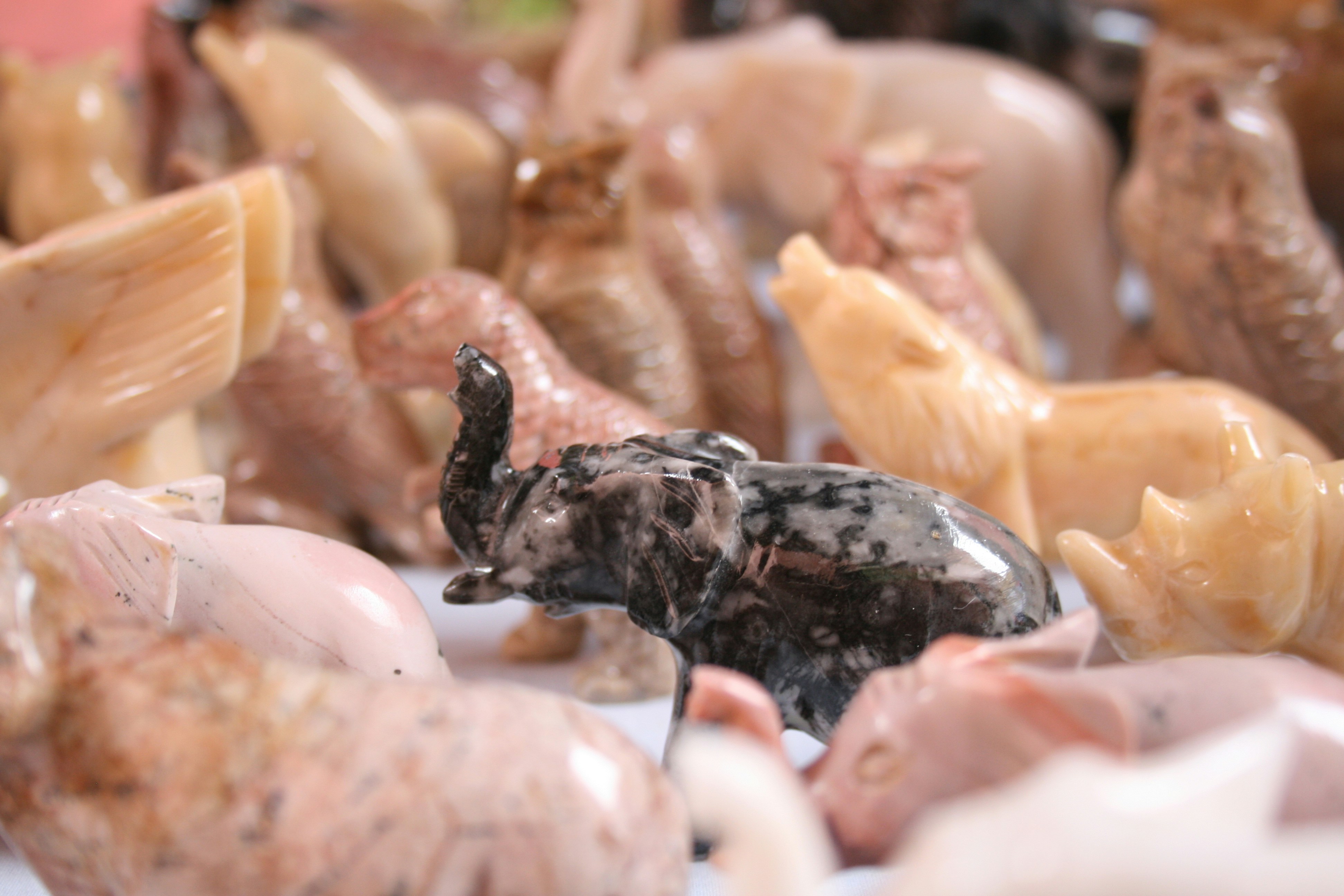 Handcrafted stone elephant | Collection of small carved stone animal figurines