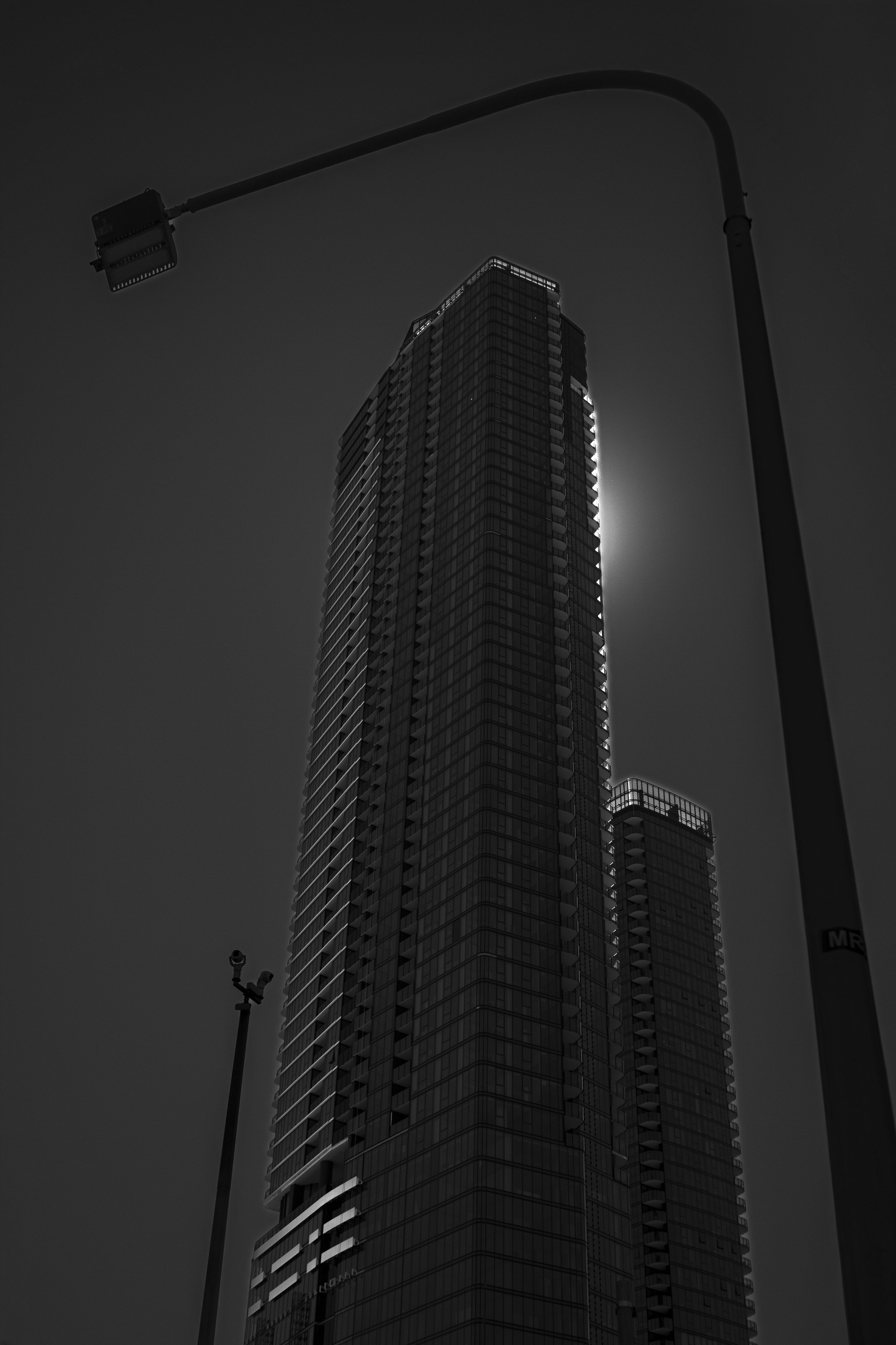 Tall modern skyscrapers against a dark sky