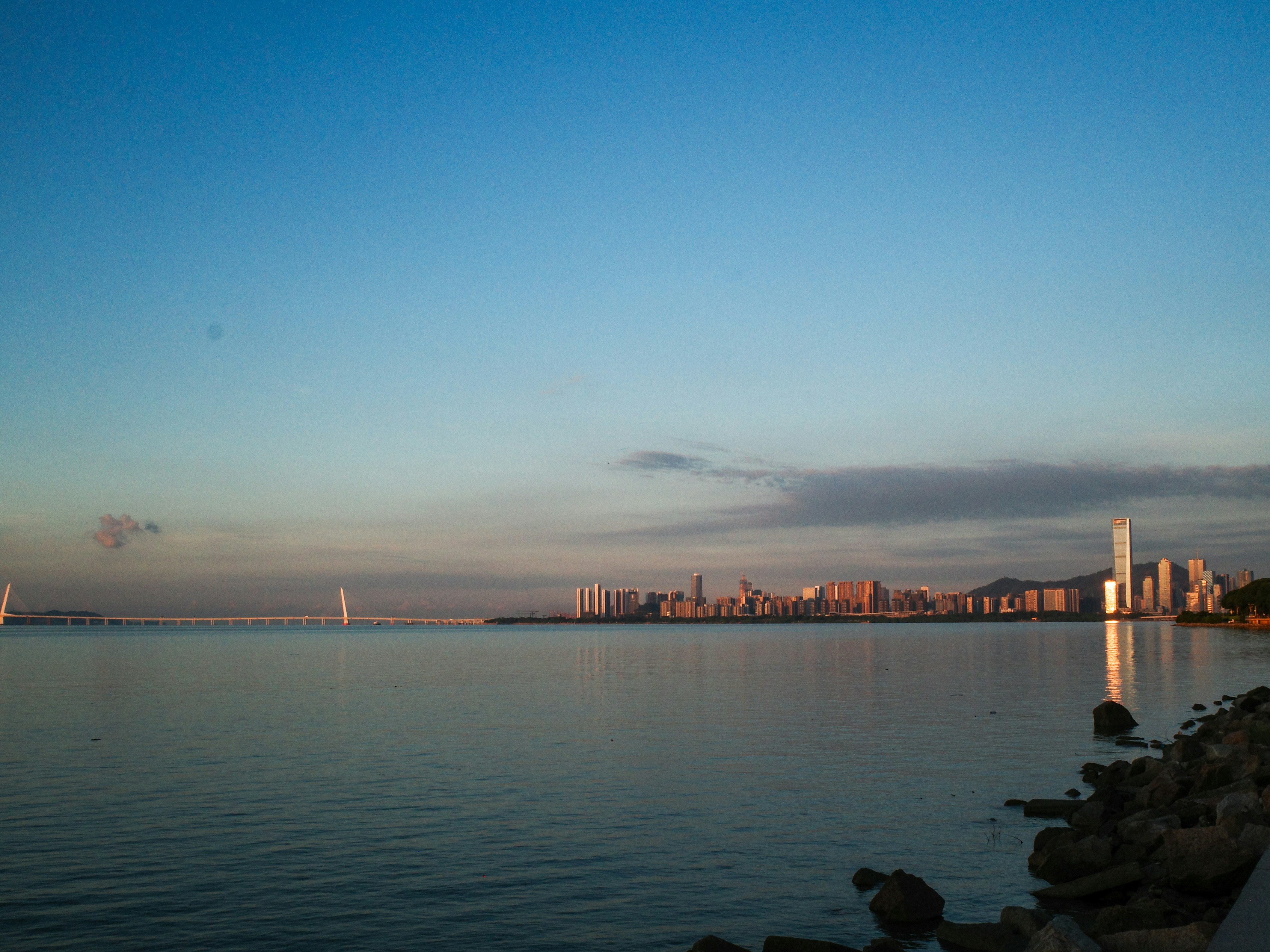 City skyline across the water at dusk