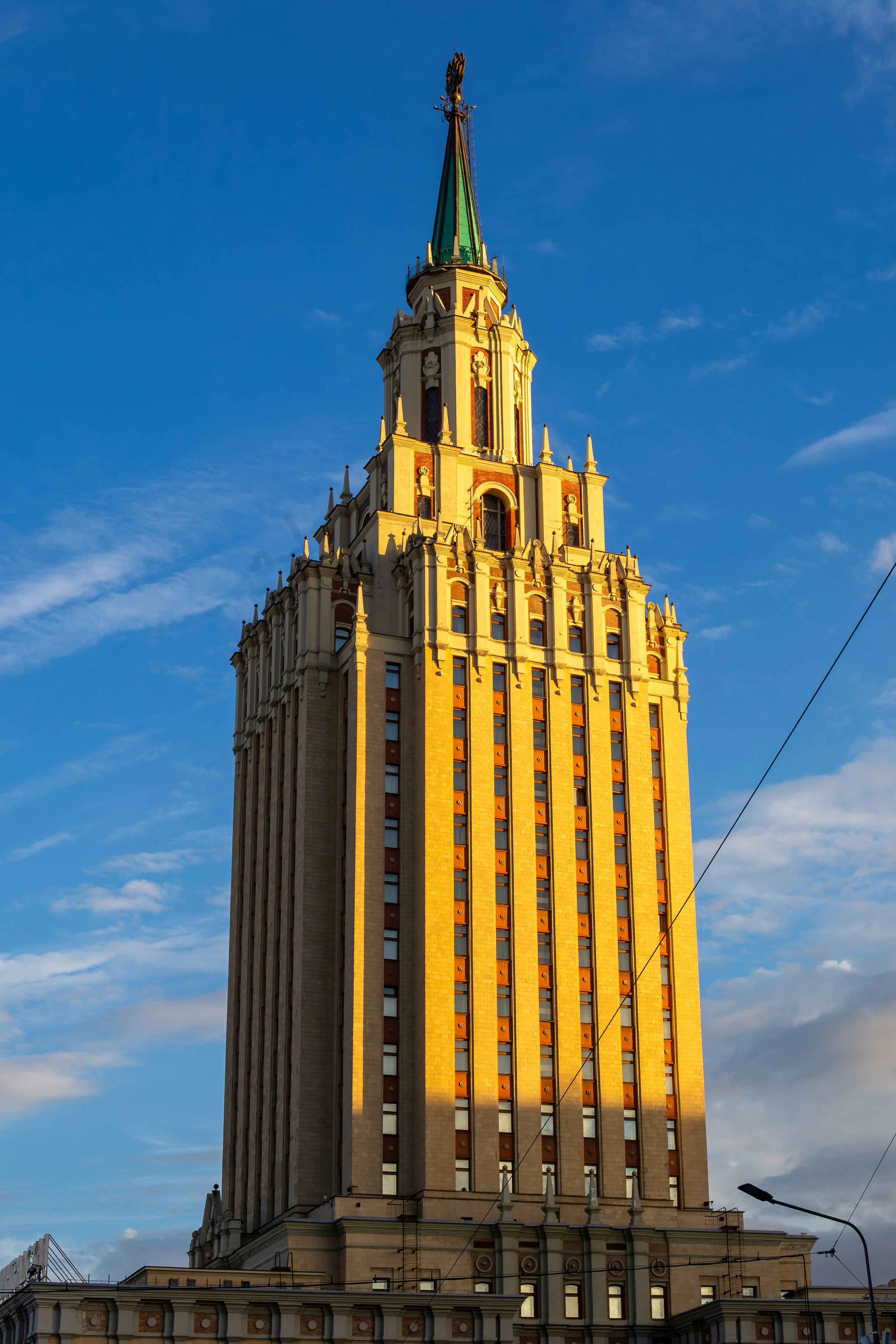 Tall art deco skyscraper against a blue sky