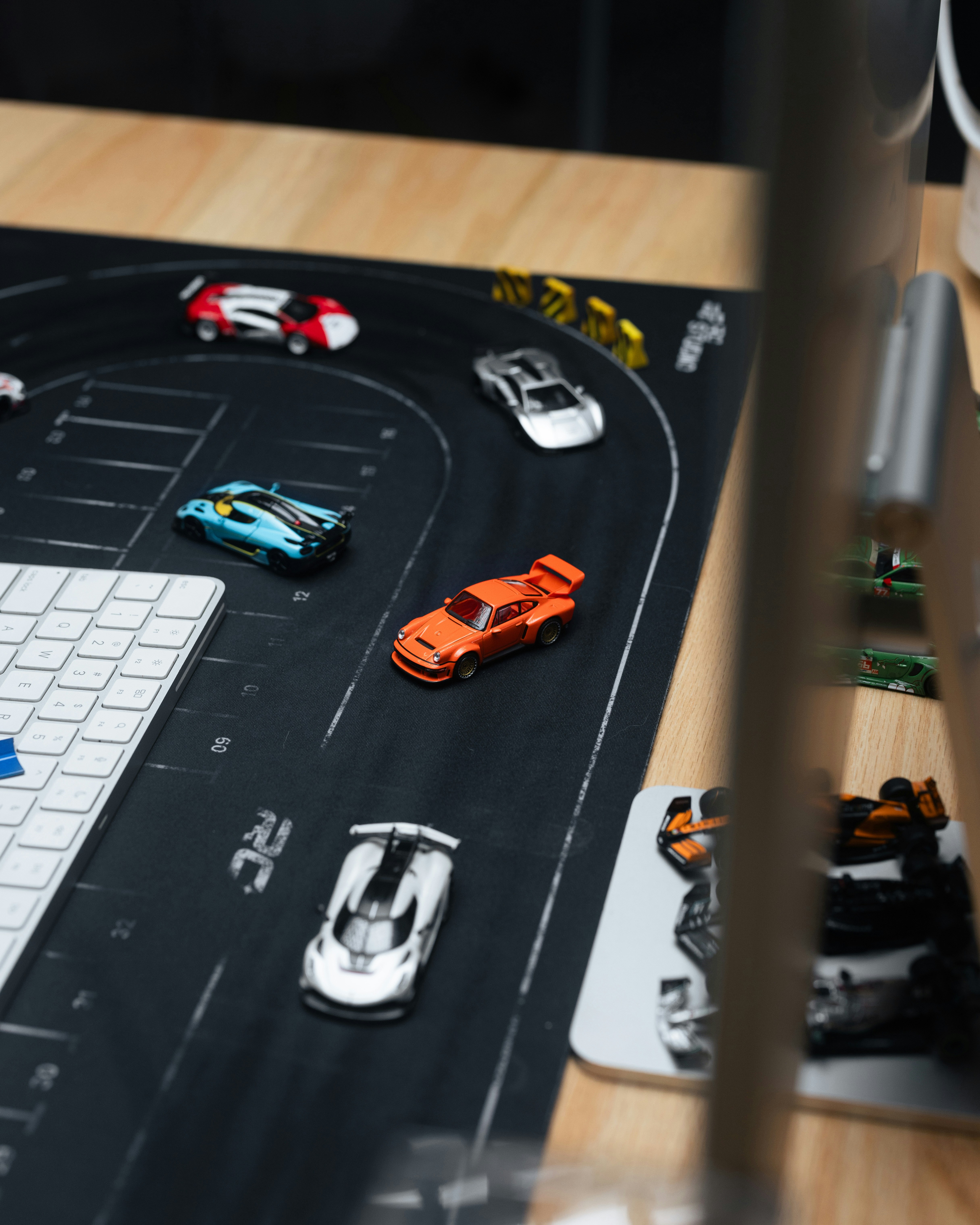 Toy race cars on a track with keyboard elements of keyboard photo ...