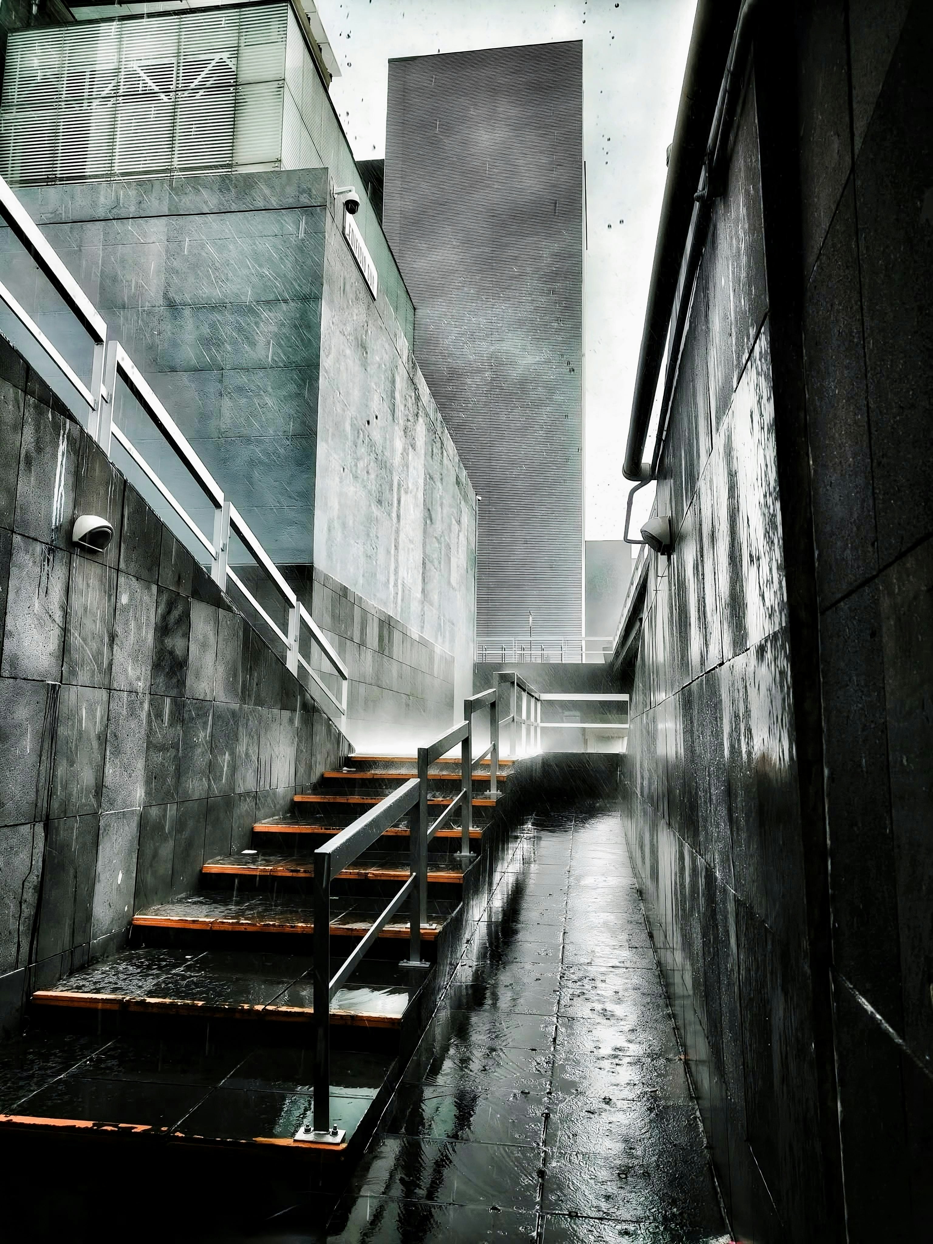 Wet stairs and alleyway with modern architecture photo – Free Free ...