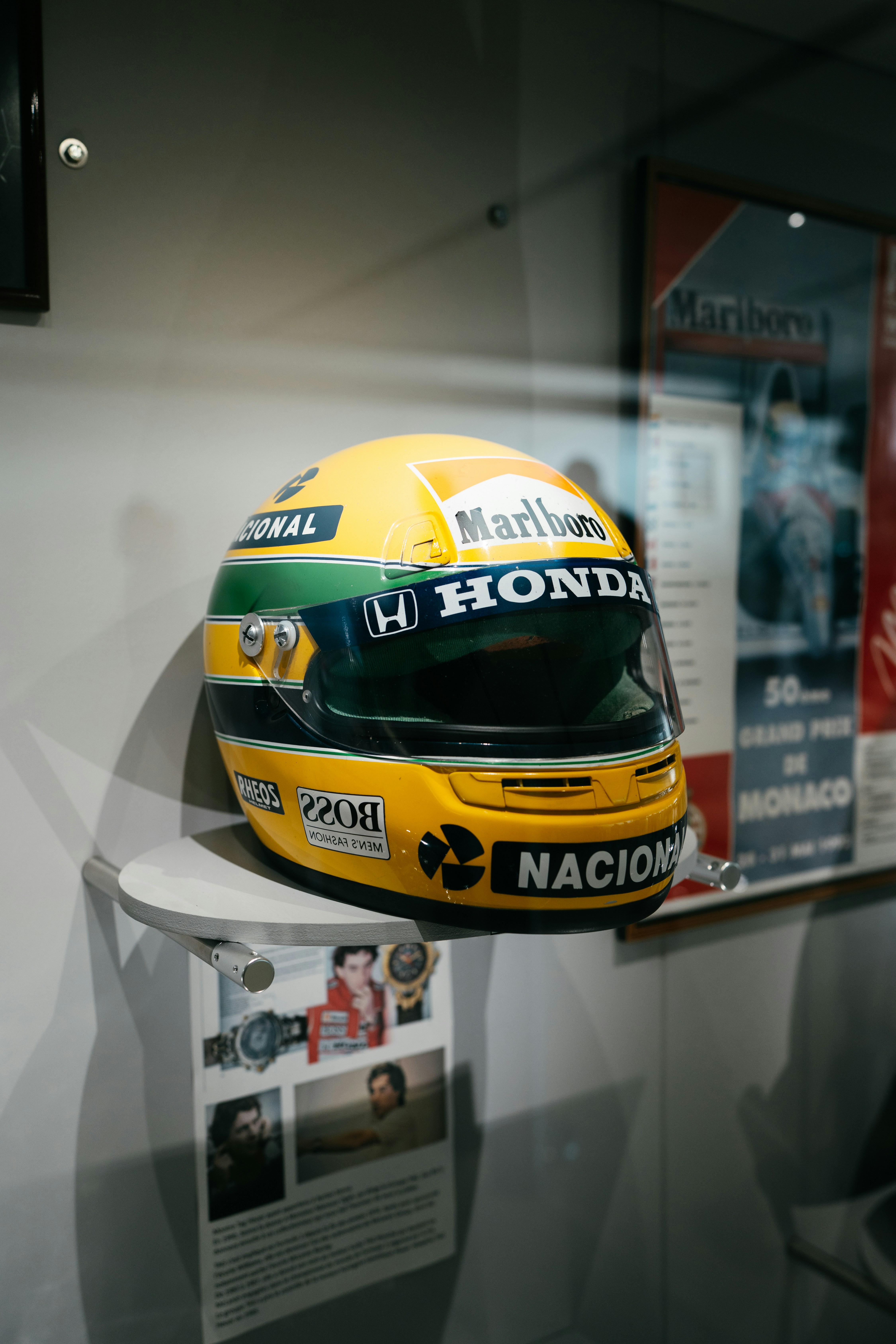 A yellow racing helmet with honda and marlboro logos. photo – Free ...