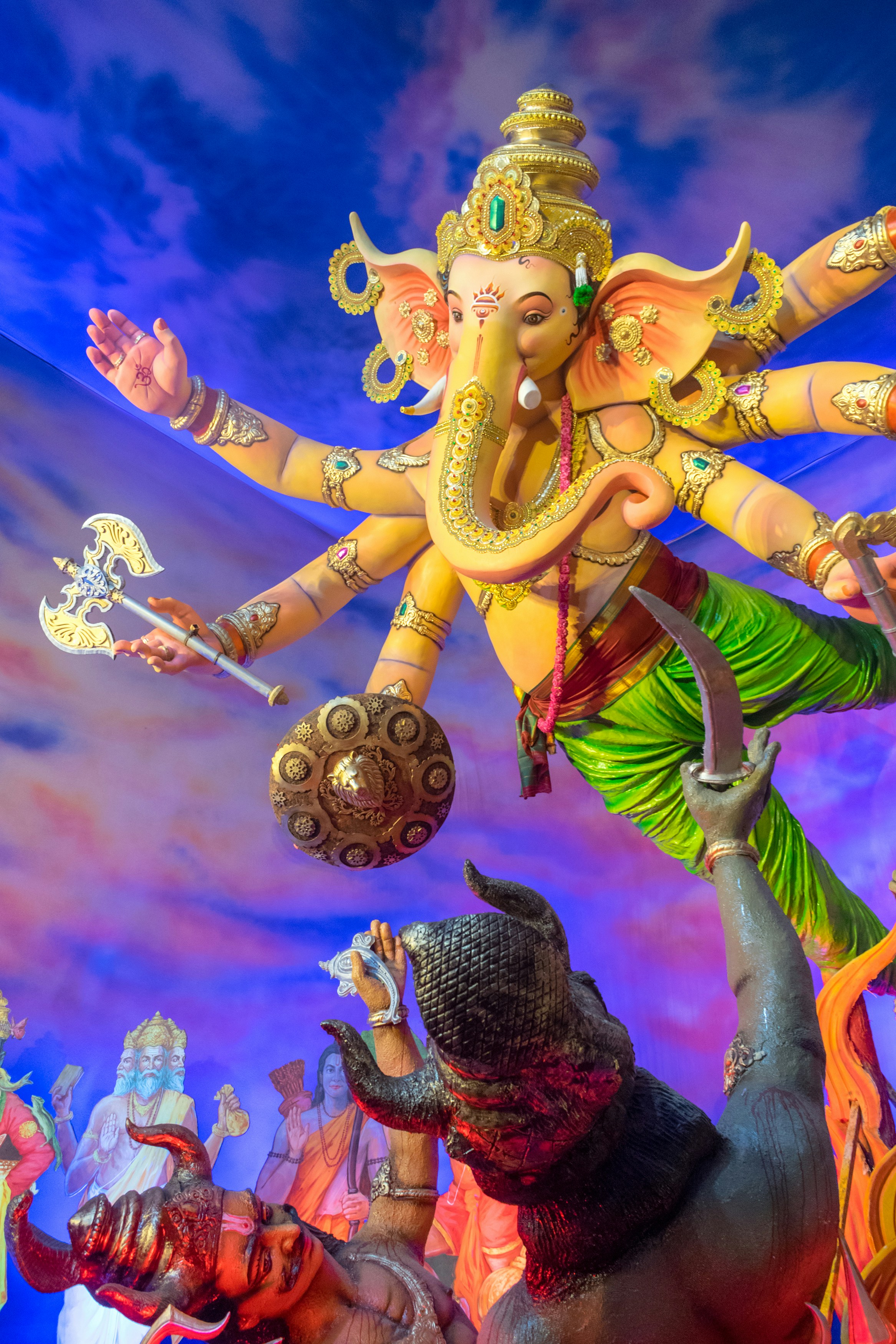 Ganesha deity in dynamic pose with multiple arms. photo – Free Ganesh ...