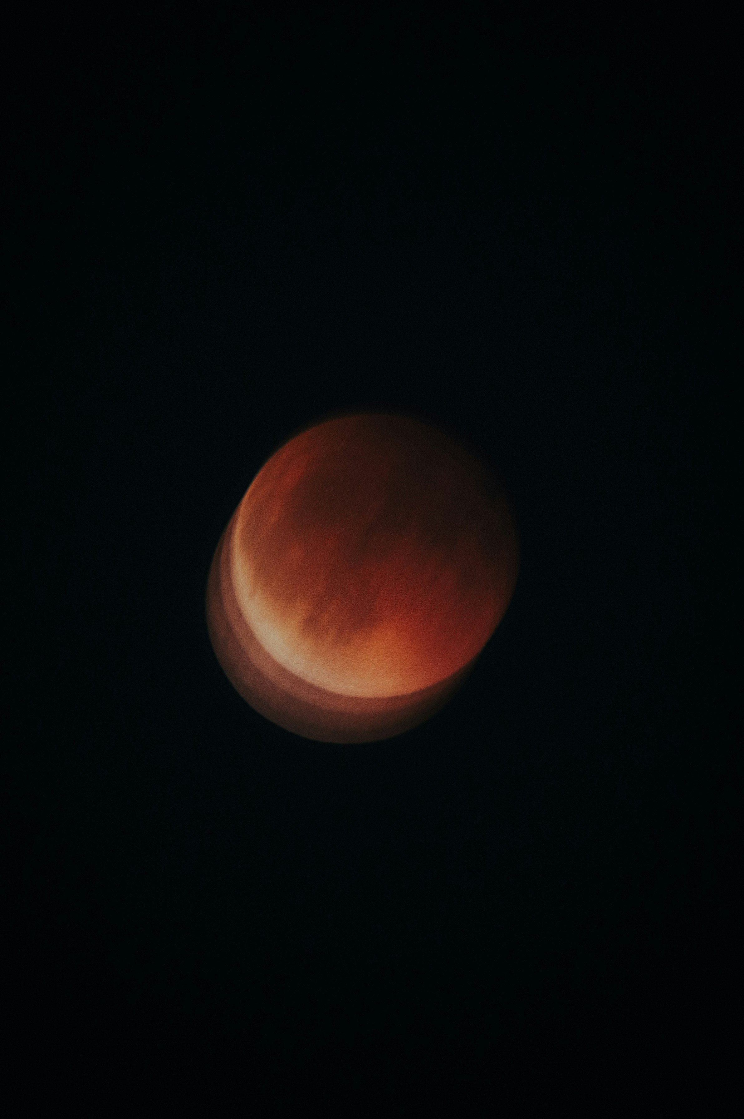 Celestial Dance: The Moon's Shadowed Embrace