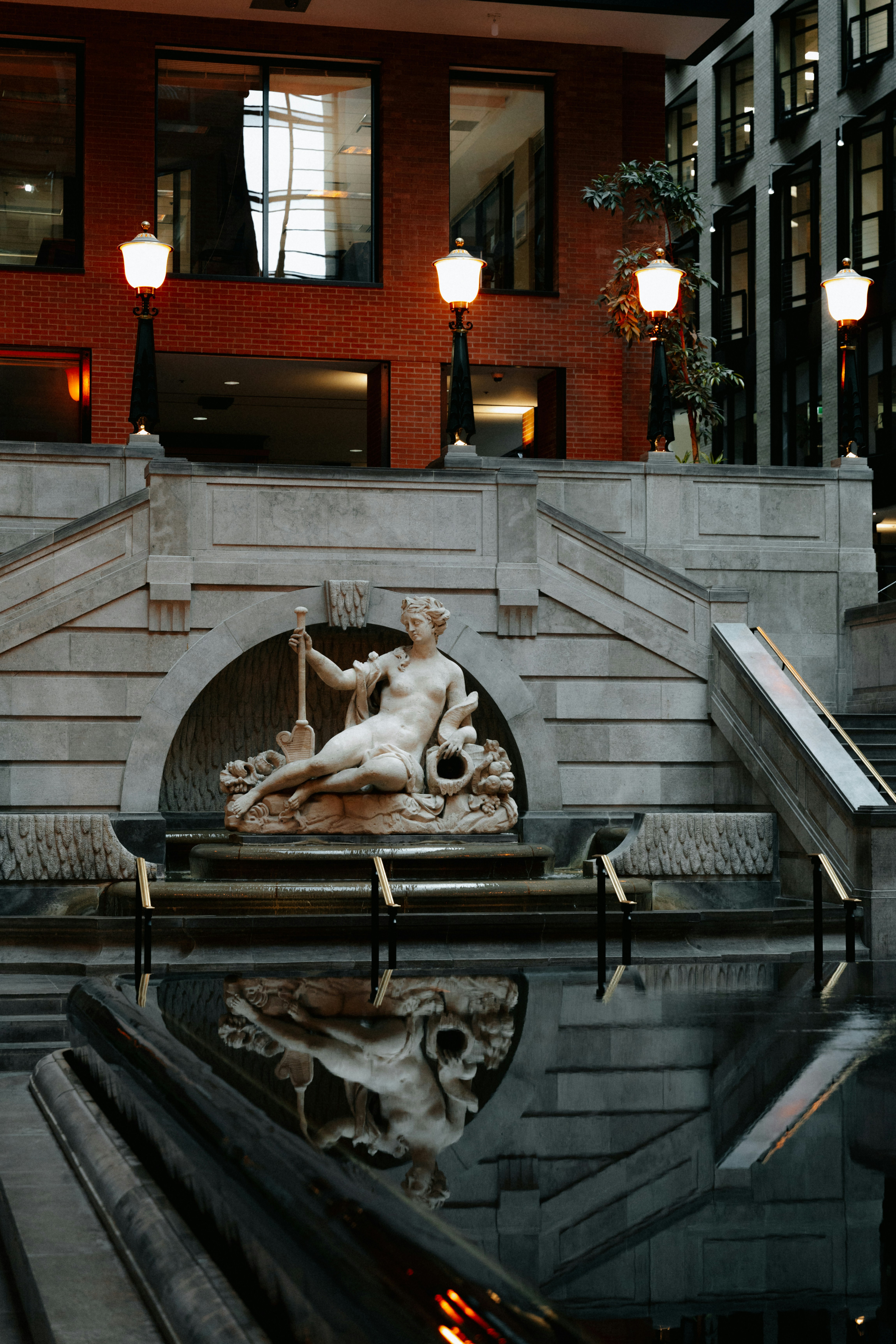 Statue in atrium with ornate fountain and stairs photo – Free Canada ...
