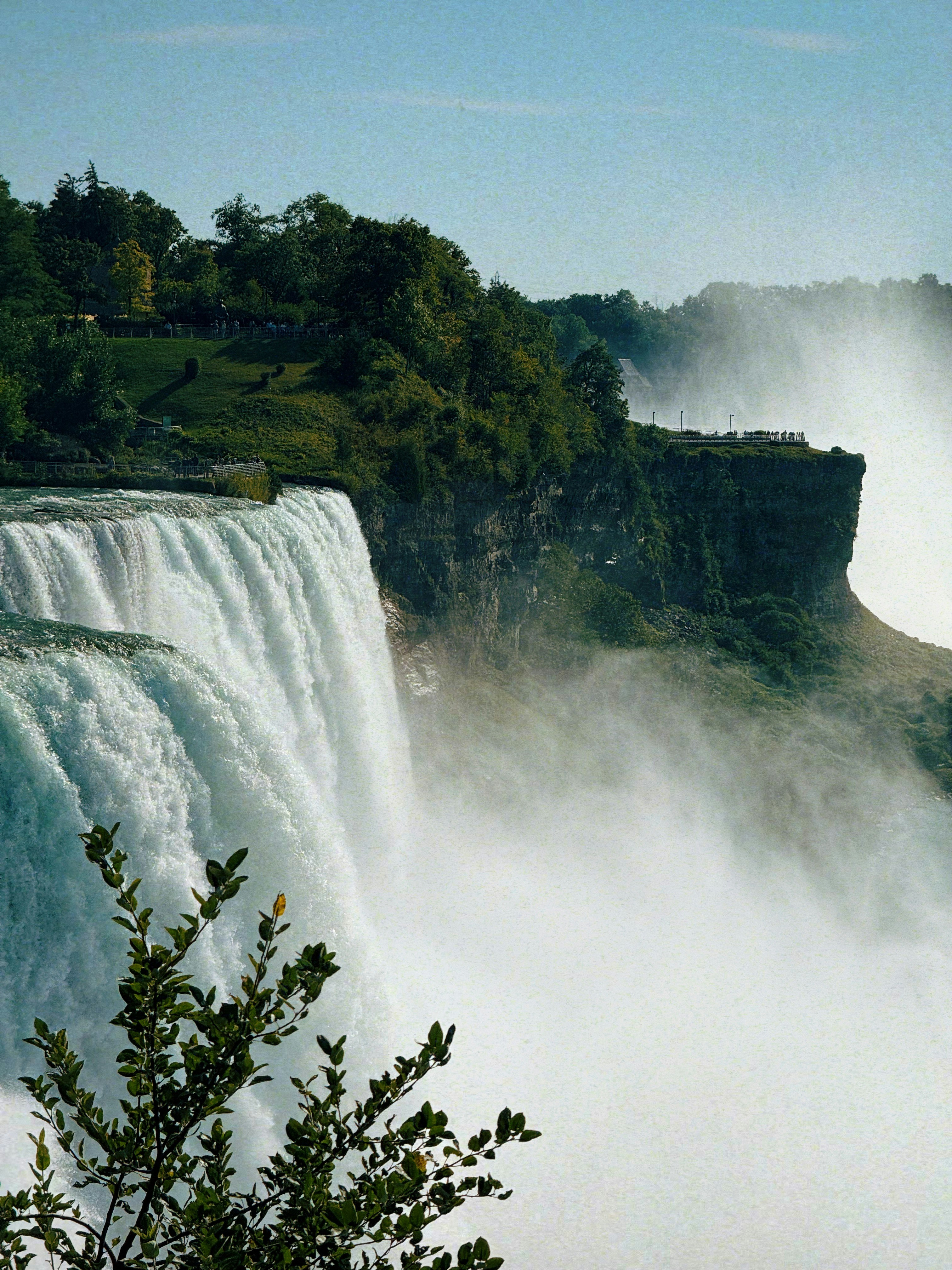 Misty Vantage Over the Crescent Falls