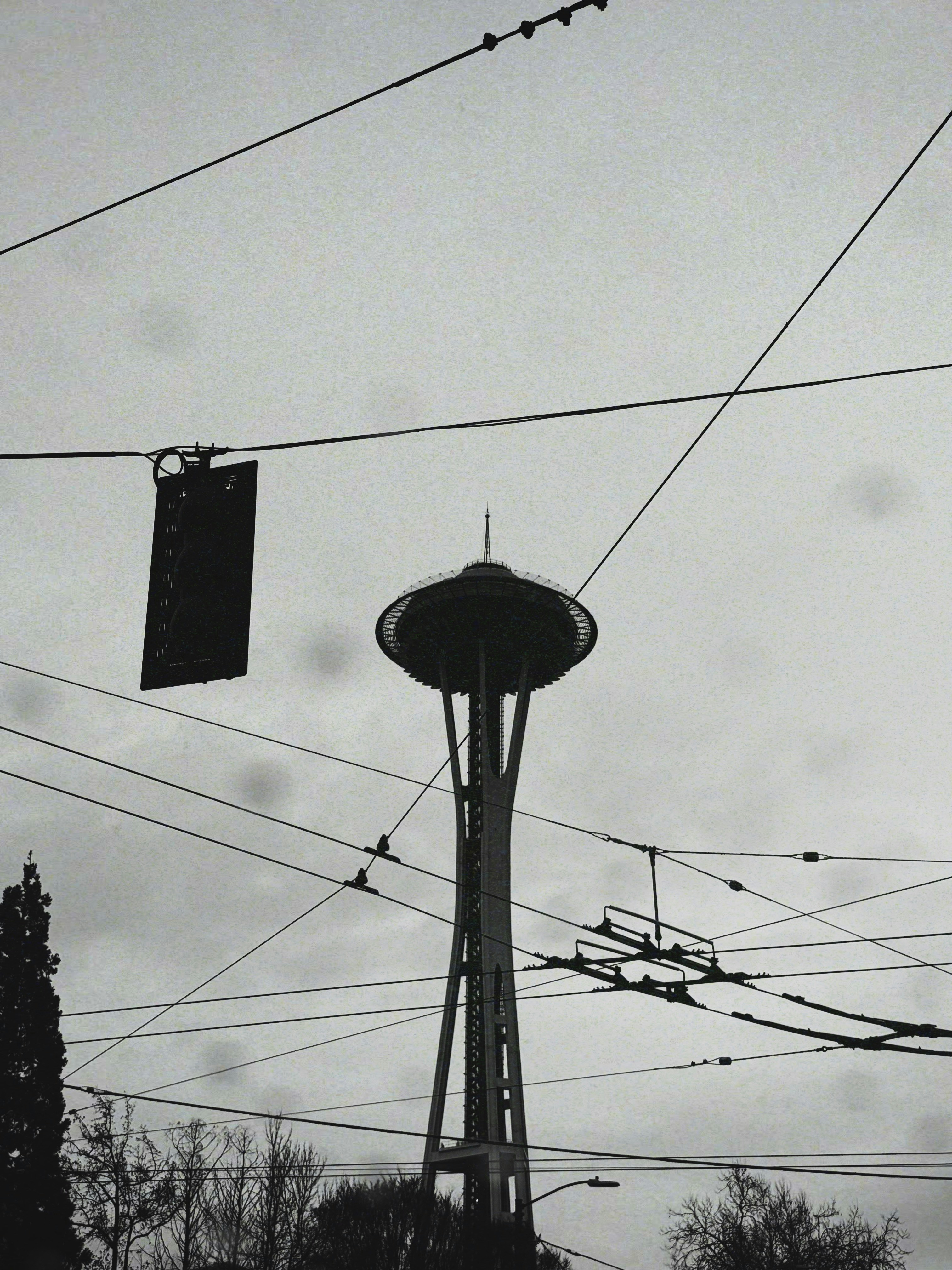 Space needle with overhead wires and cloudy sky photo – Free Usa Image on Unsplash