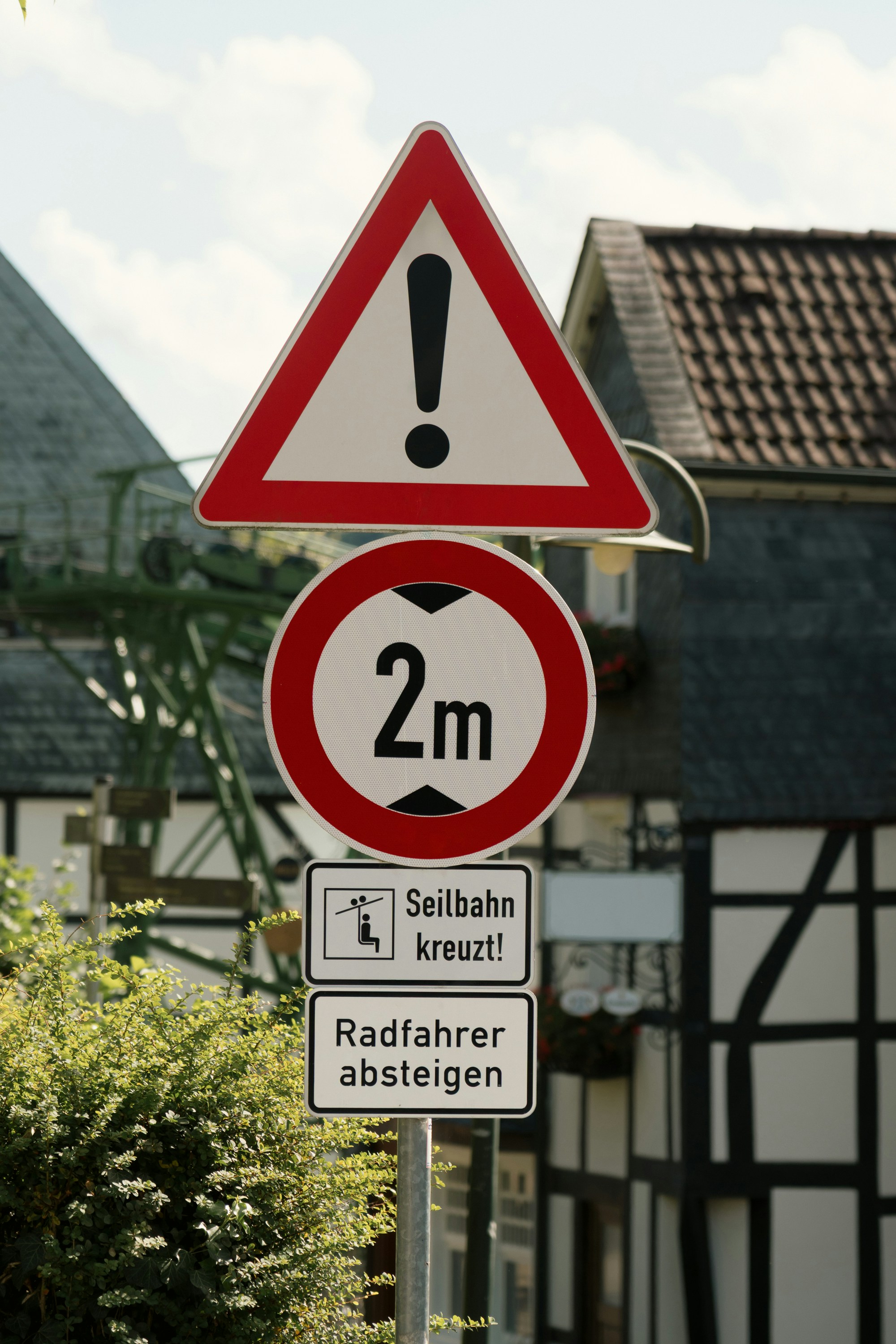 Road signs indicating height limit and cable car crossing. photo – Free ...