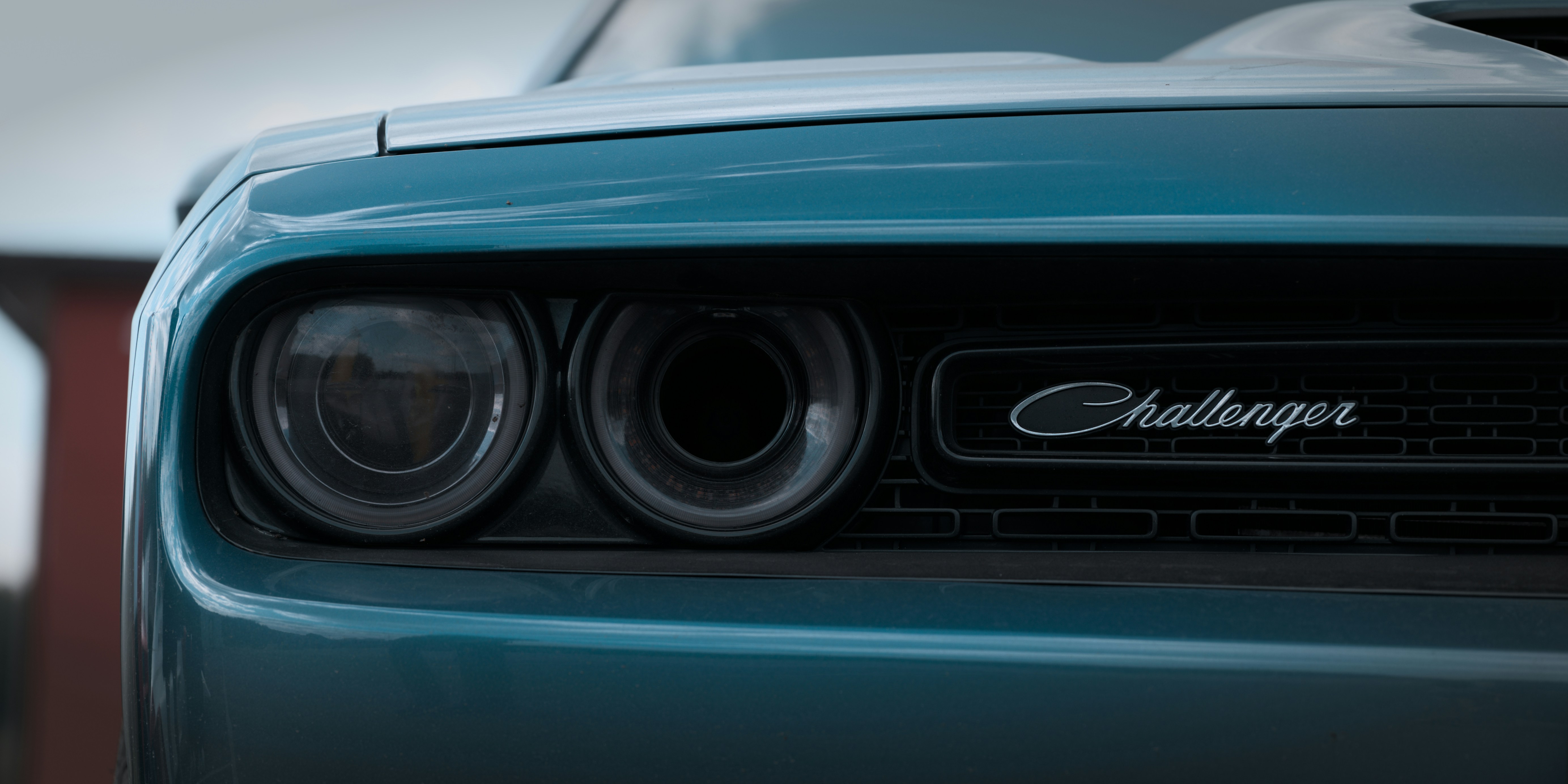 Close-up of a teal dodge challenger car grille. photo – Free Wallpaper ...