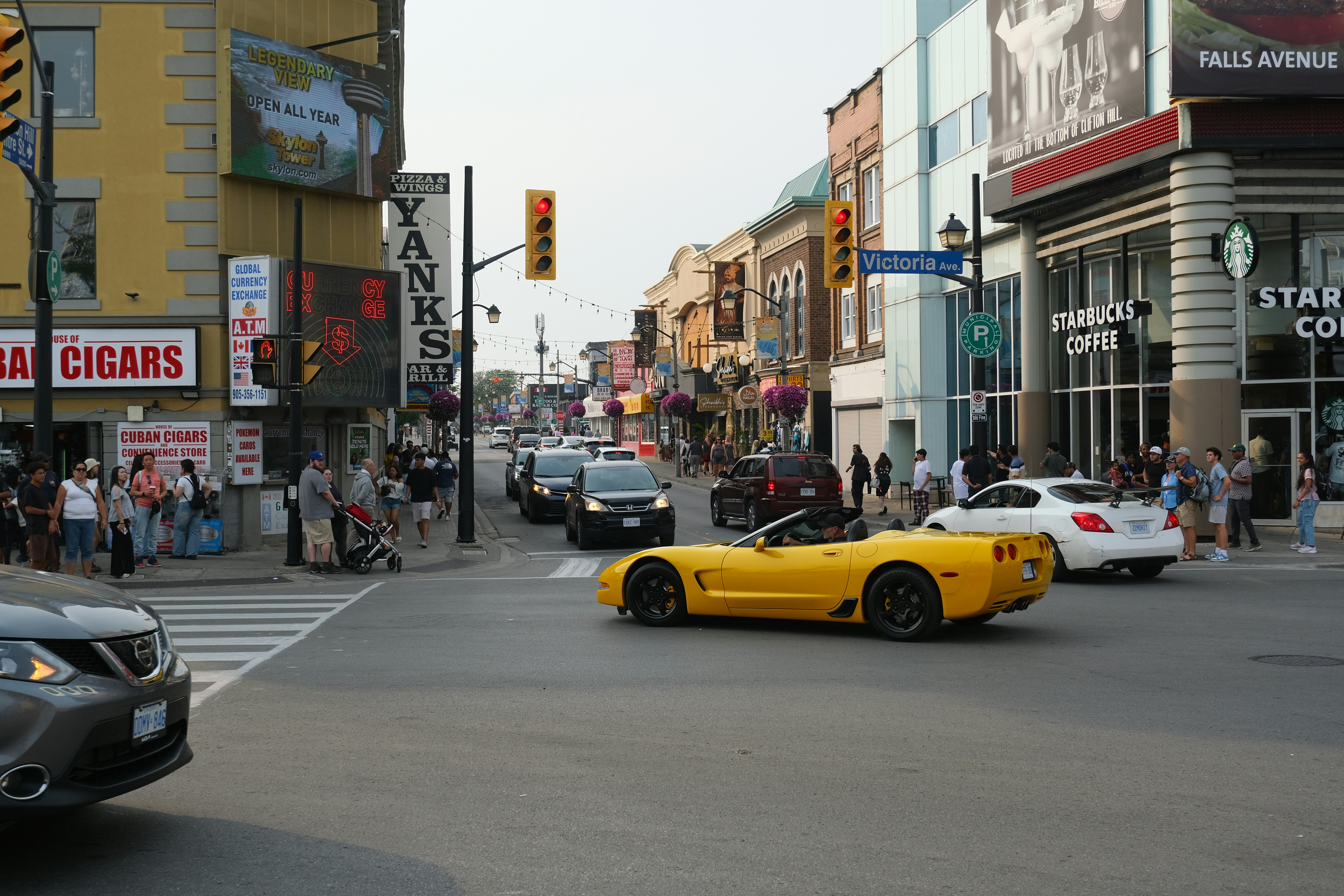 Urban Pulse: The Yellow Corvette in Motion