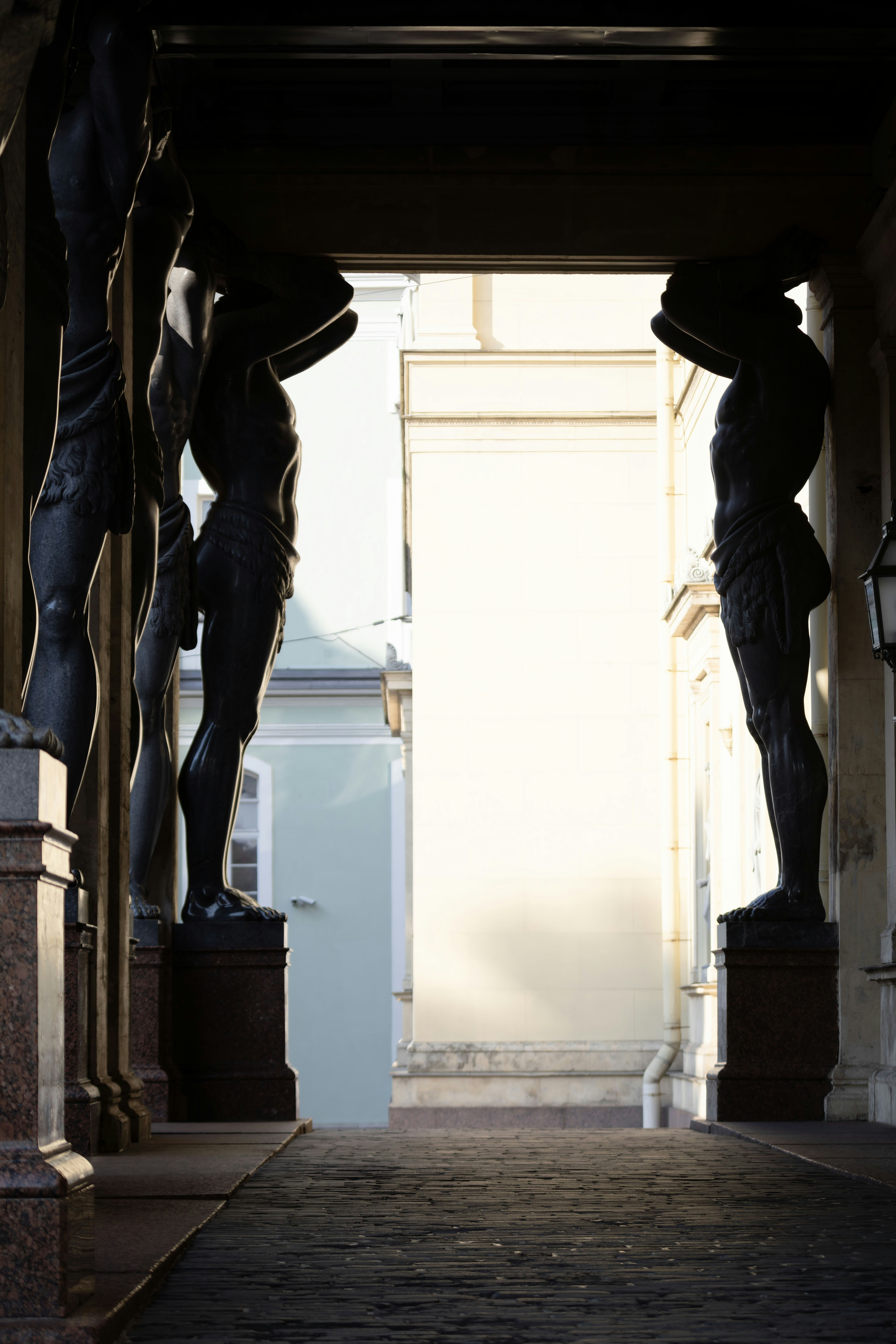 Saint Petersburg | Statues of men holding up an architectural structure