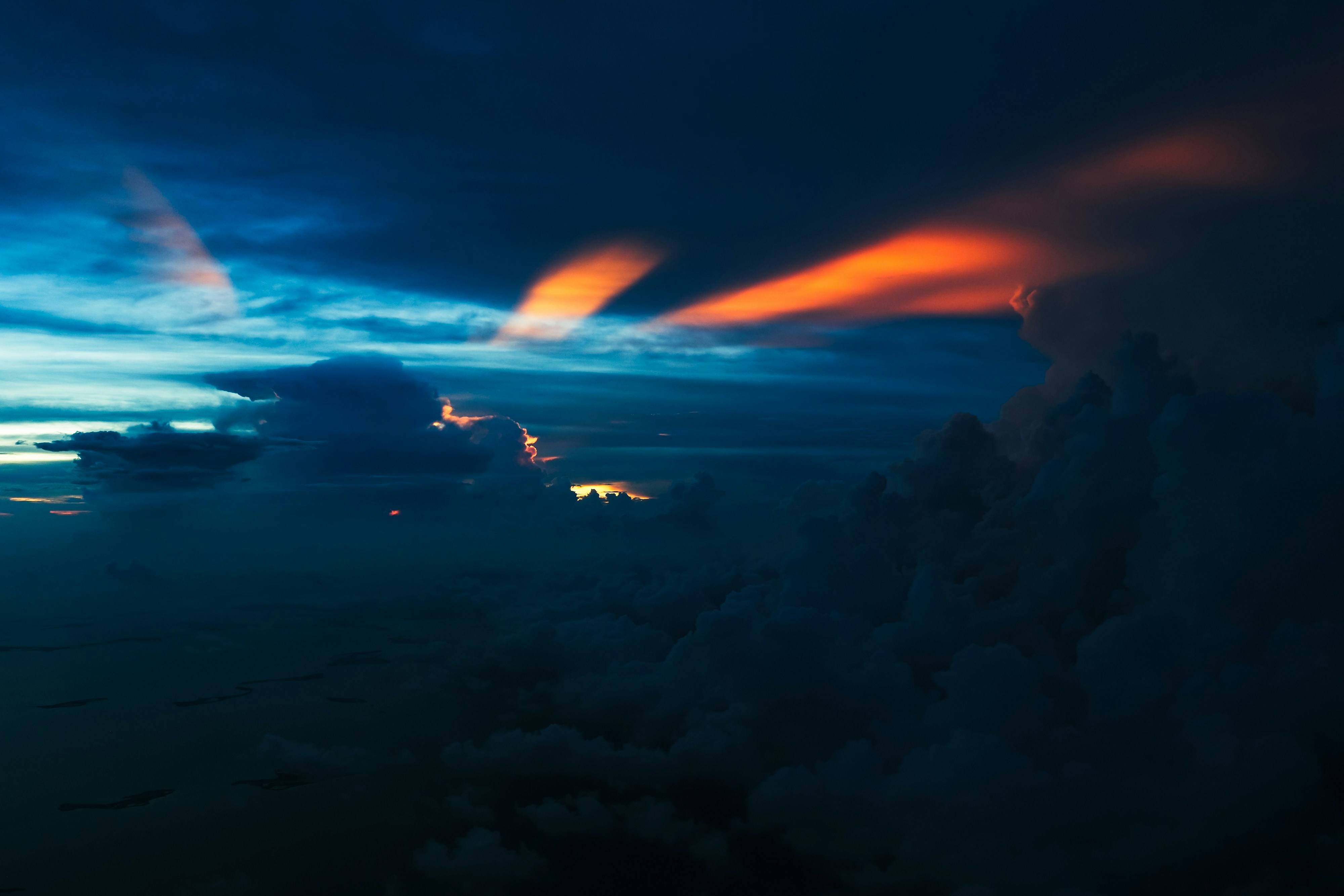 Dramatic sunset clouds with orange and blue light
