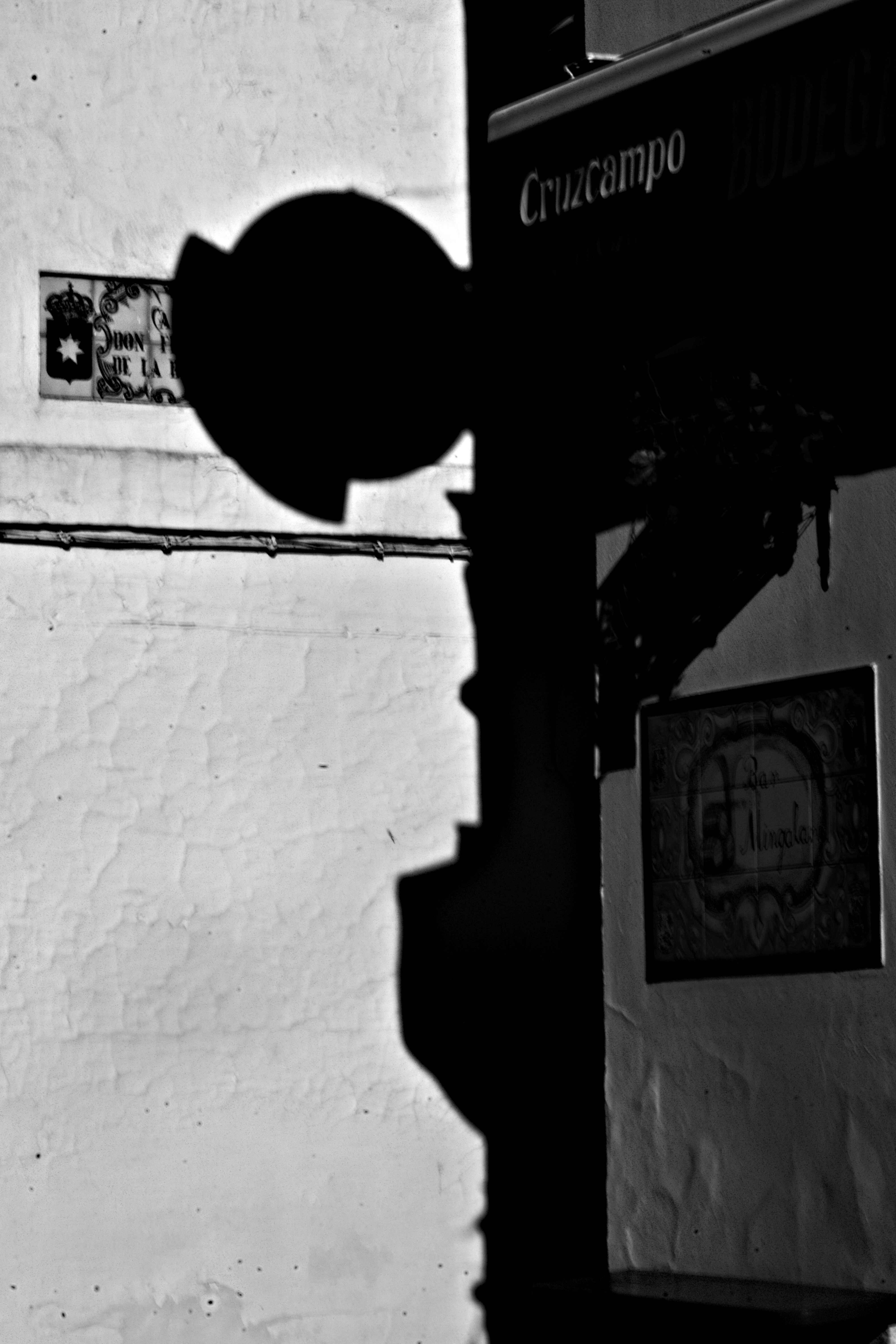 In summer the light the sun created very hard hadows on the walls of the buildings. I used nthese shadows to create some compositions
