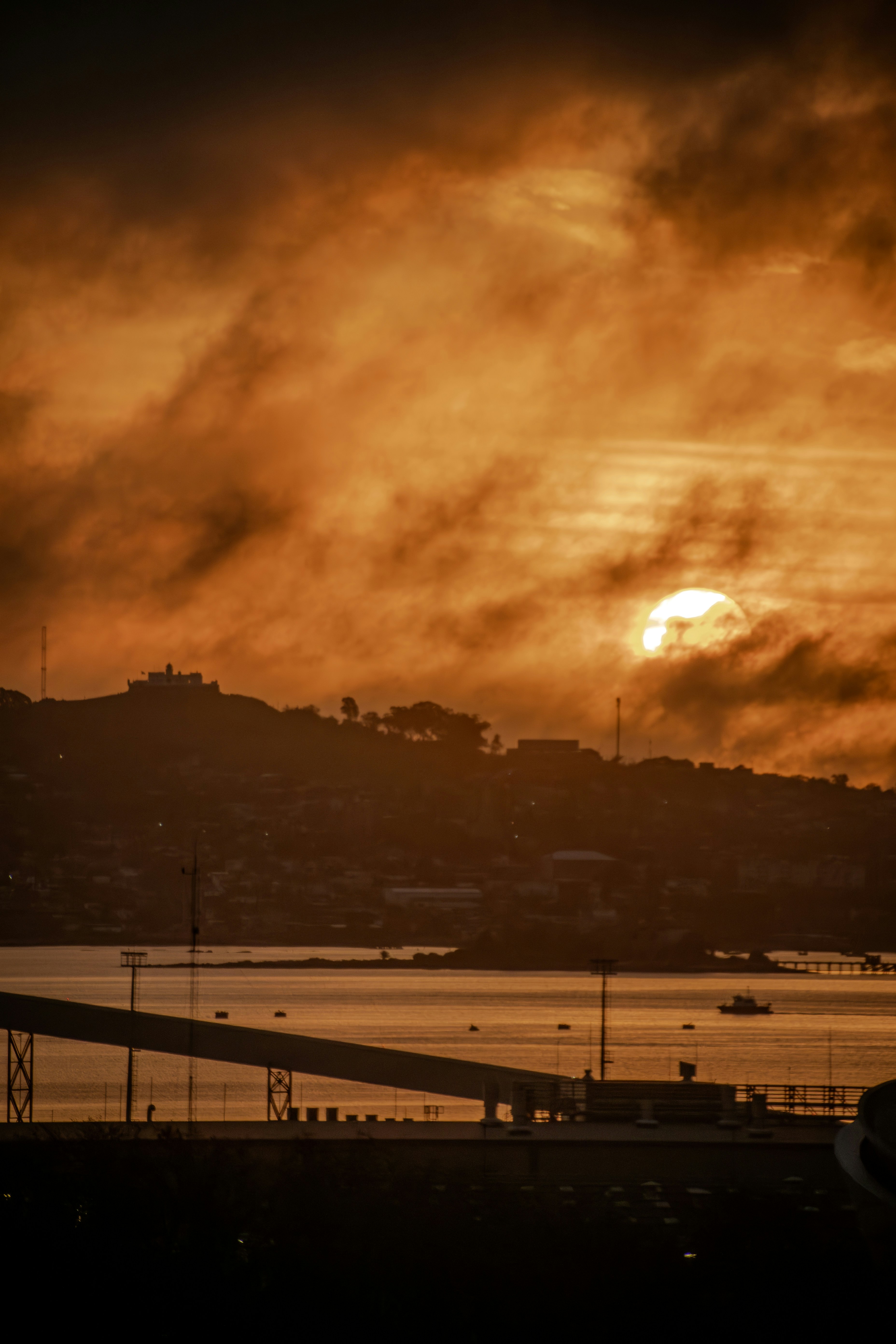 Crimson Dusk Over the Silhouetted Harbor Bridge