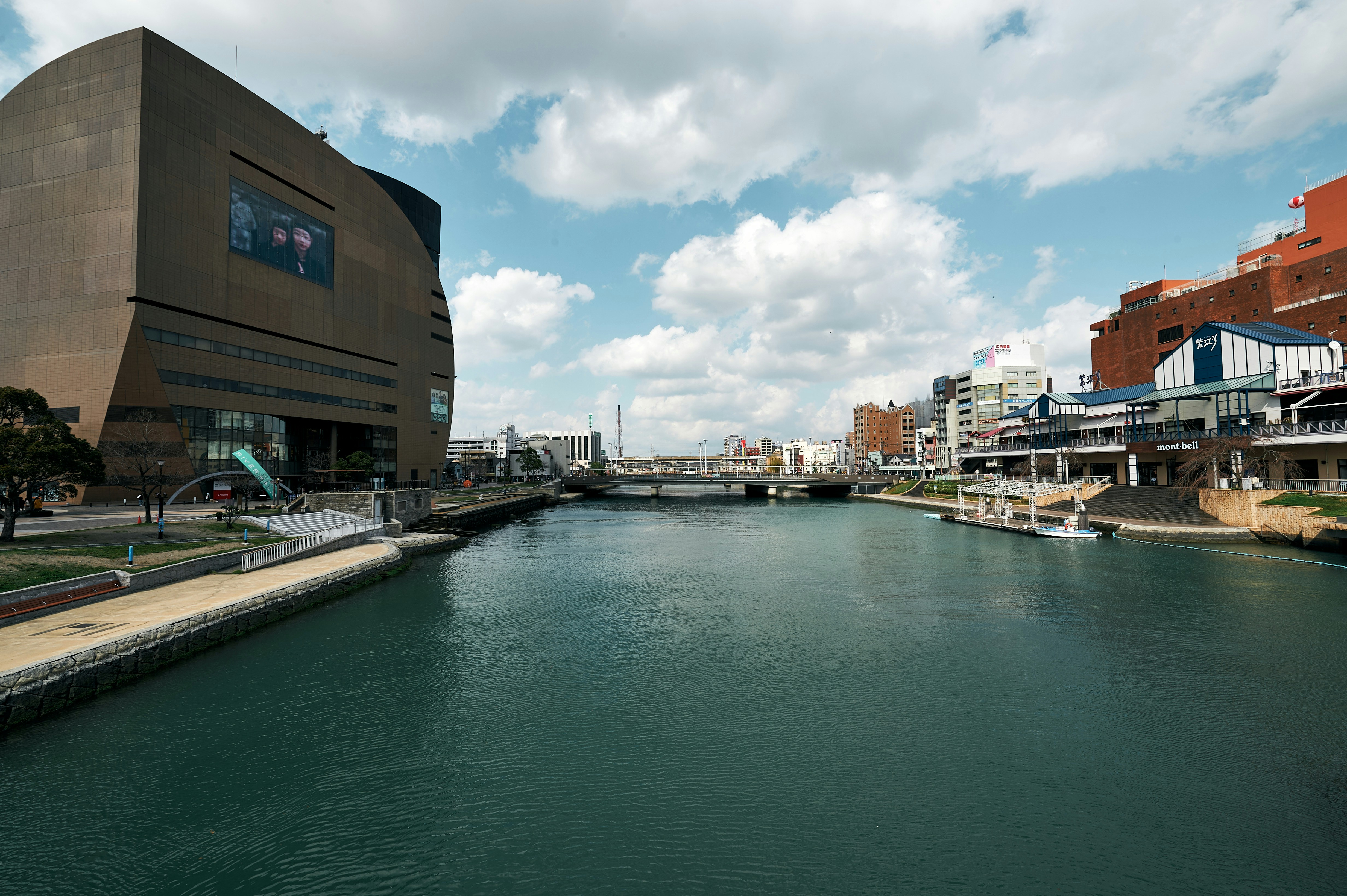 Reflections of Urban Life: A River's Embrace