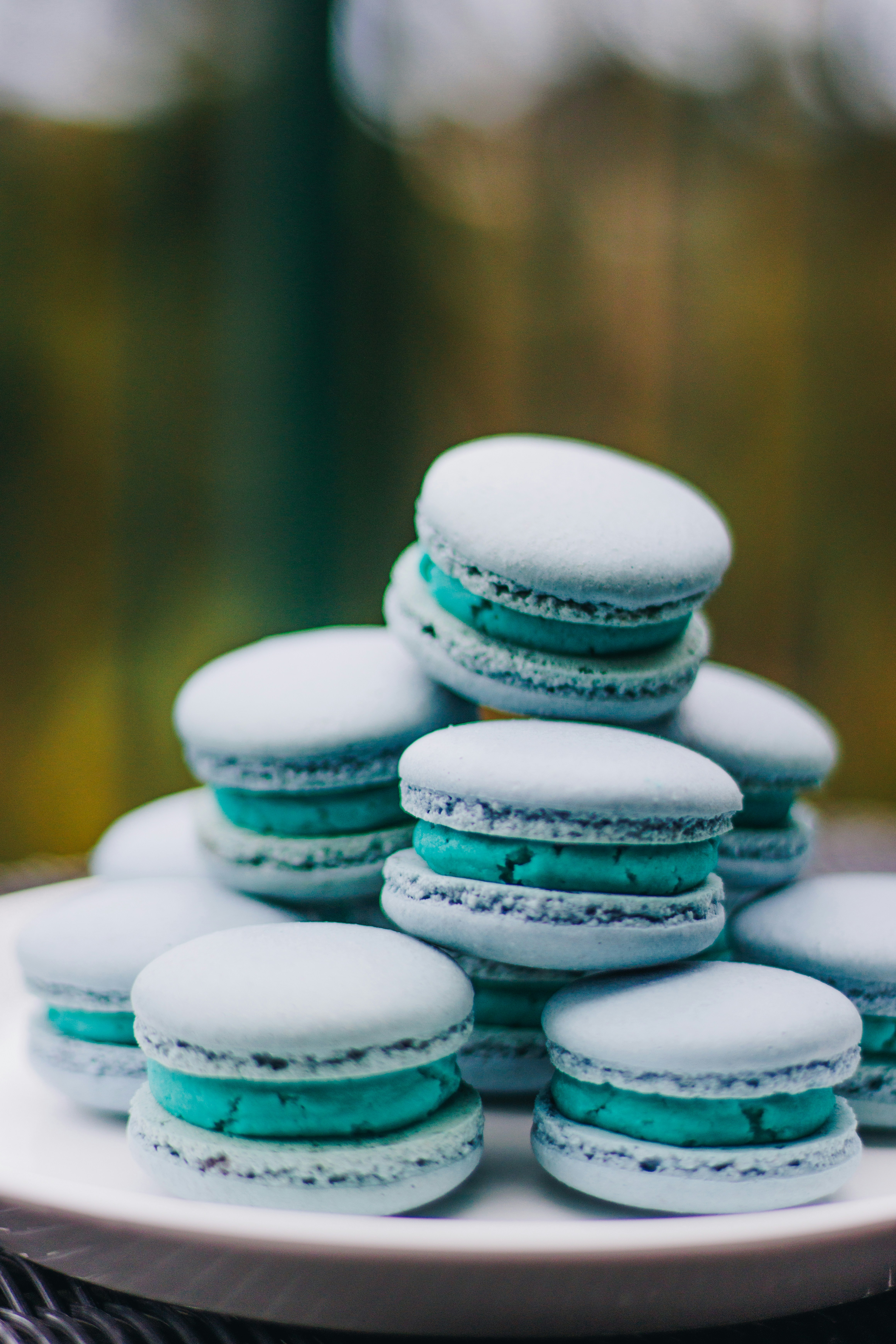 Stack of pale blue macarons with teal filling photo – Free Image on ...