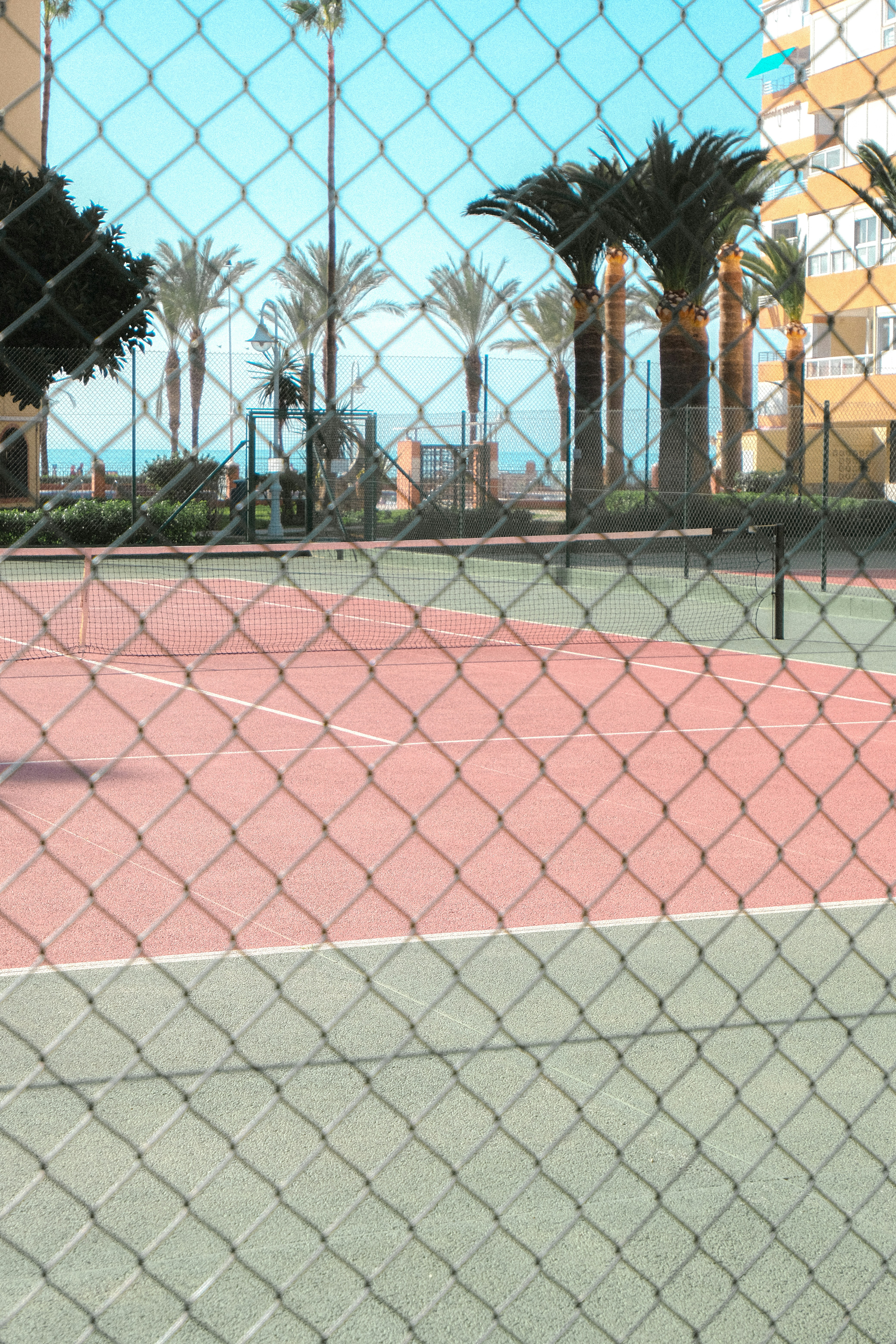 Tennis Court Oasis Amidst Urban Serenity