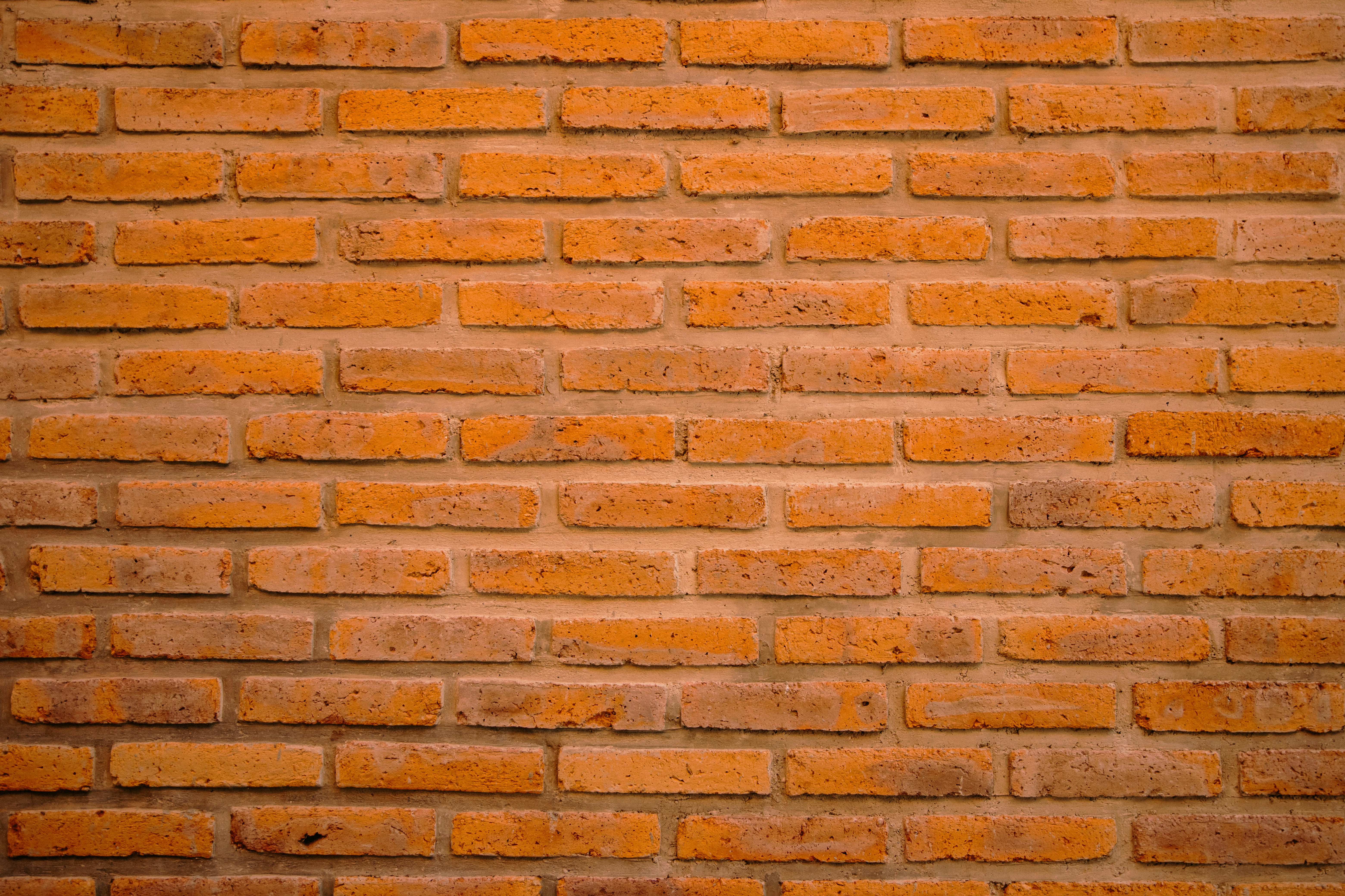 Terracotta Grid: Close-Up of Weathered Brick Wall
